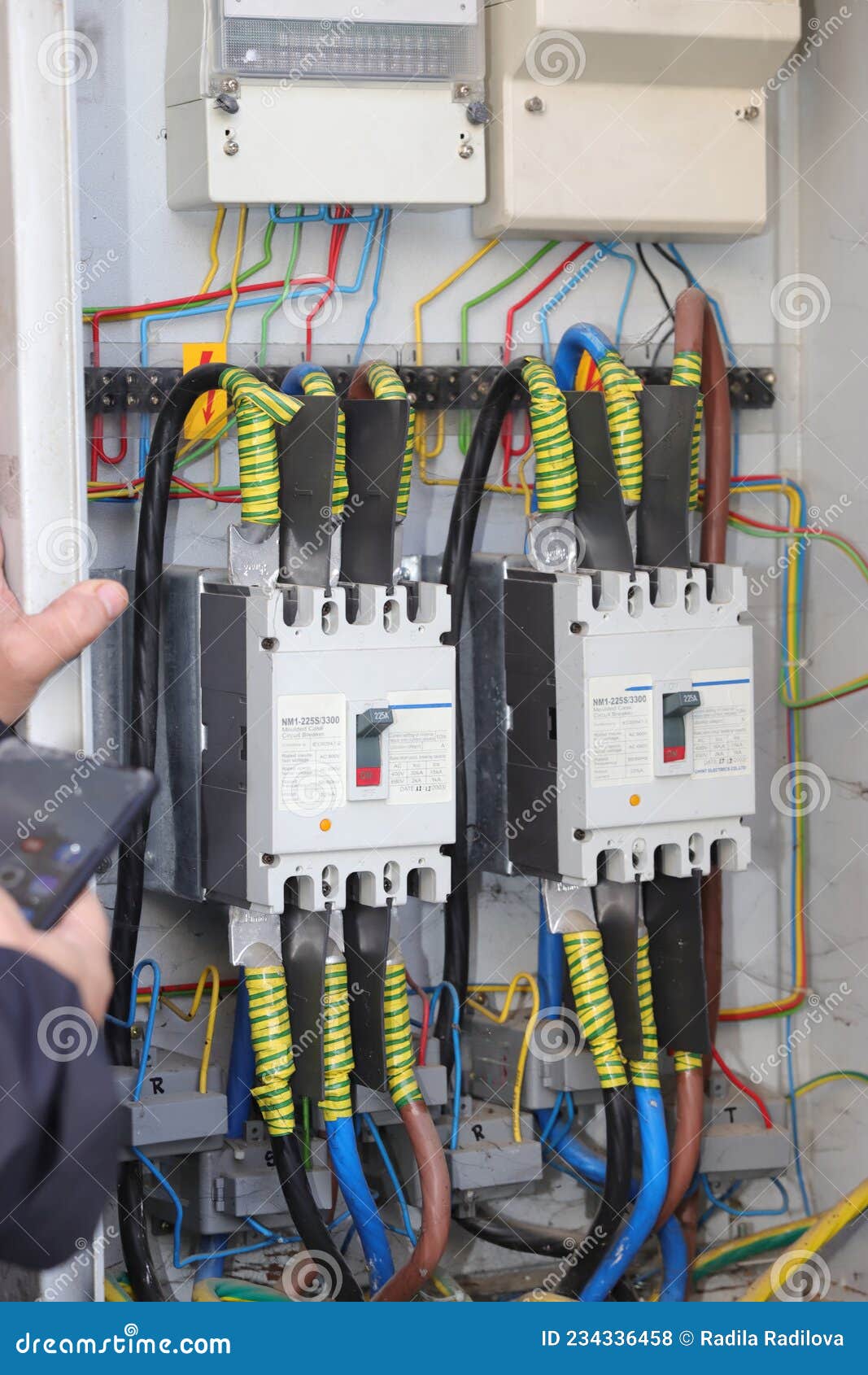 Technician Doing Meter Reading on Electric Cables for Kilowatt Hour ... Technician Doing Meter Reading on Electric Cables for Kilowatt Hour ...