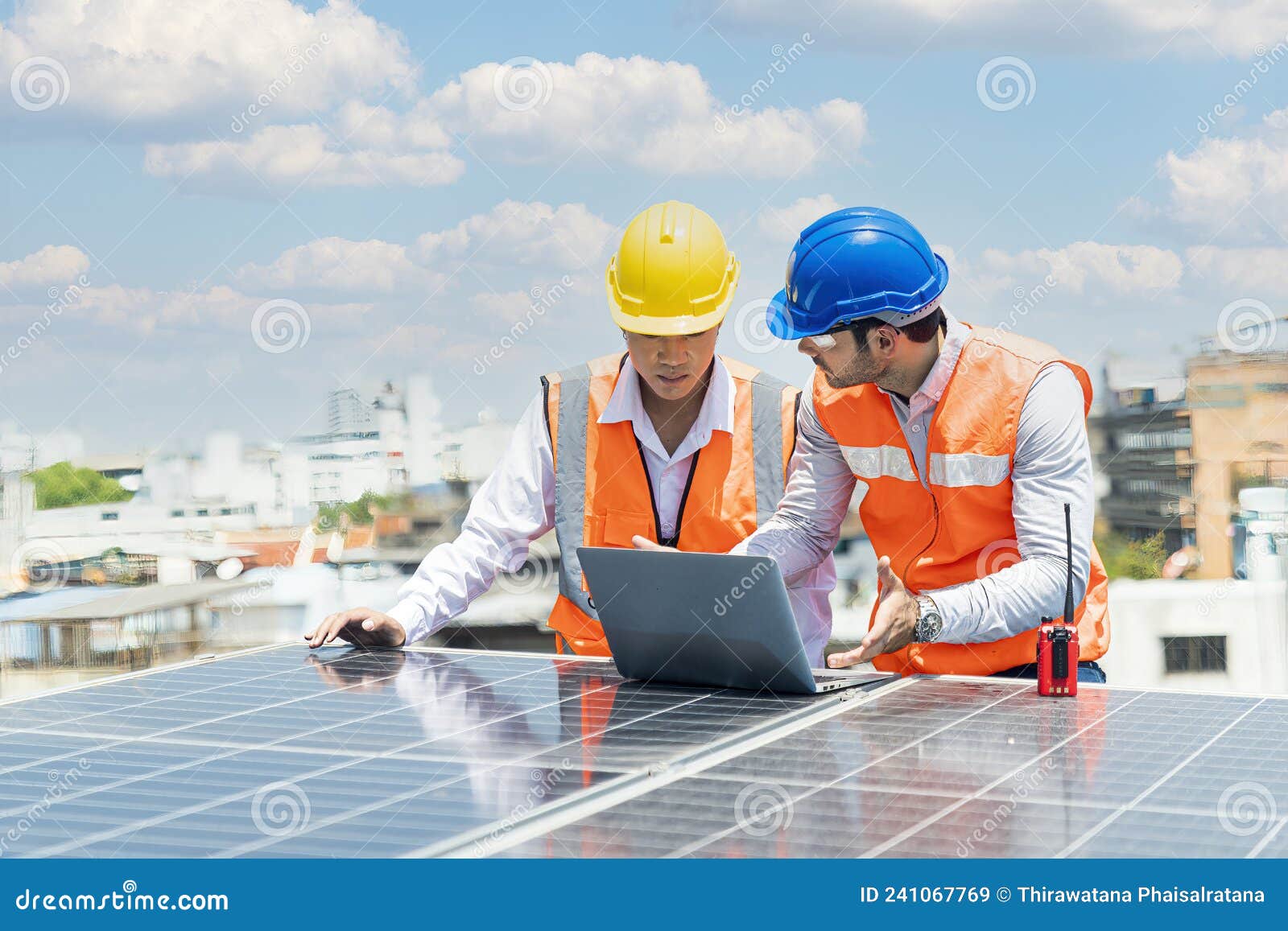 A Technician or Electrical Engineer is Teaching an Apprentice To Work ...