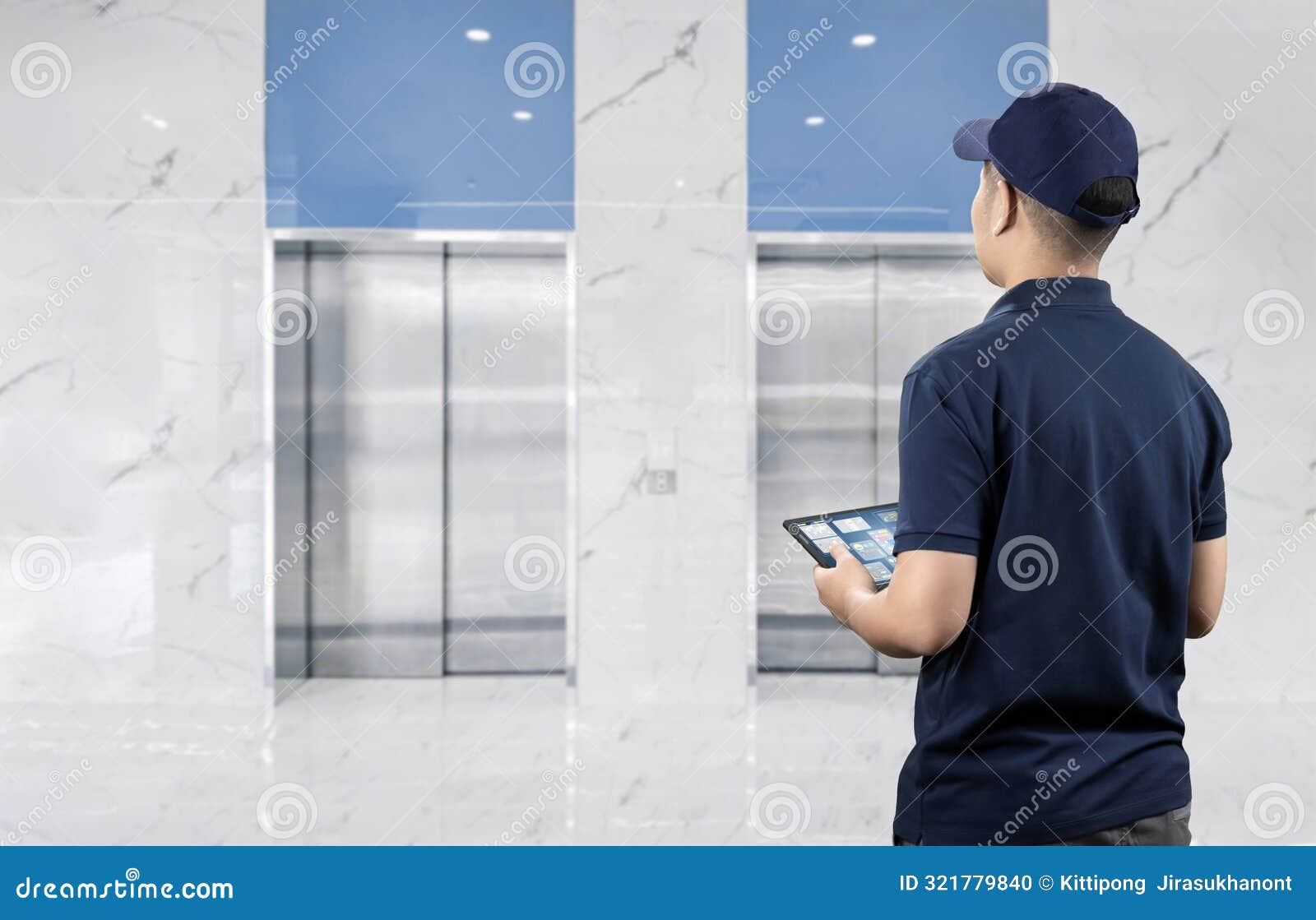 Technician or Engineer Check on Elevator or Passenger Lift Stock Photo ...