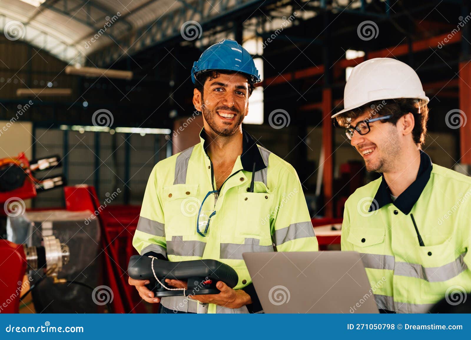 Technician Engineer Checking and Repairing Automatic Robotic Machine ...