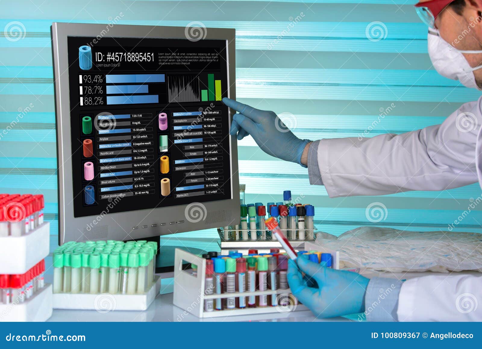 Technician Examining a Blood Sample Results with the Computer in Stock ...