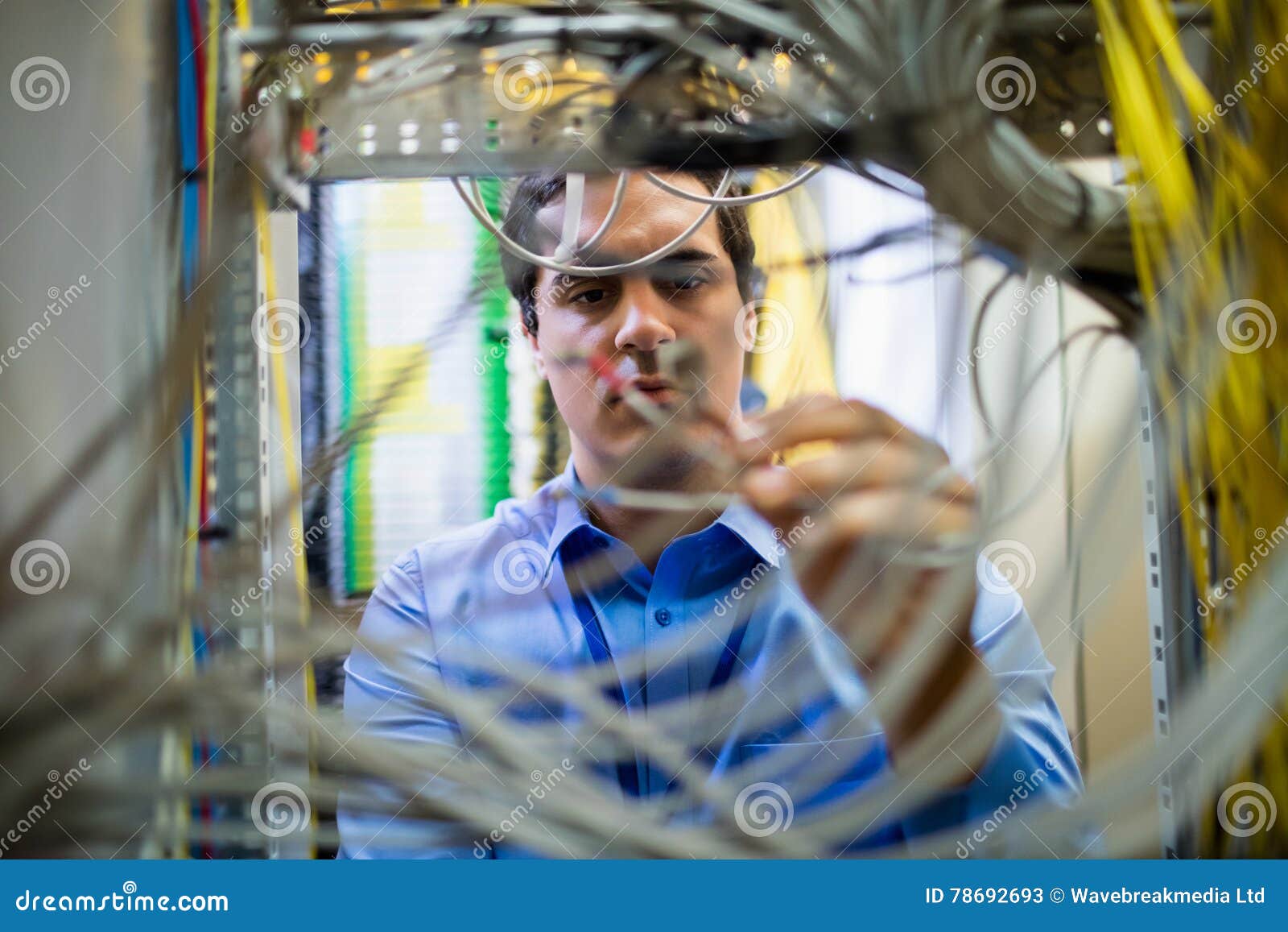Technician fixing cable stock image. Image of attentive - 78692693 Technician fixing cable stock image. Image of attentive - 78692693