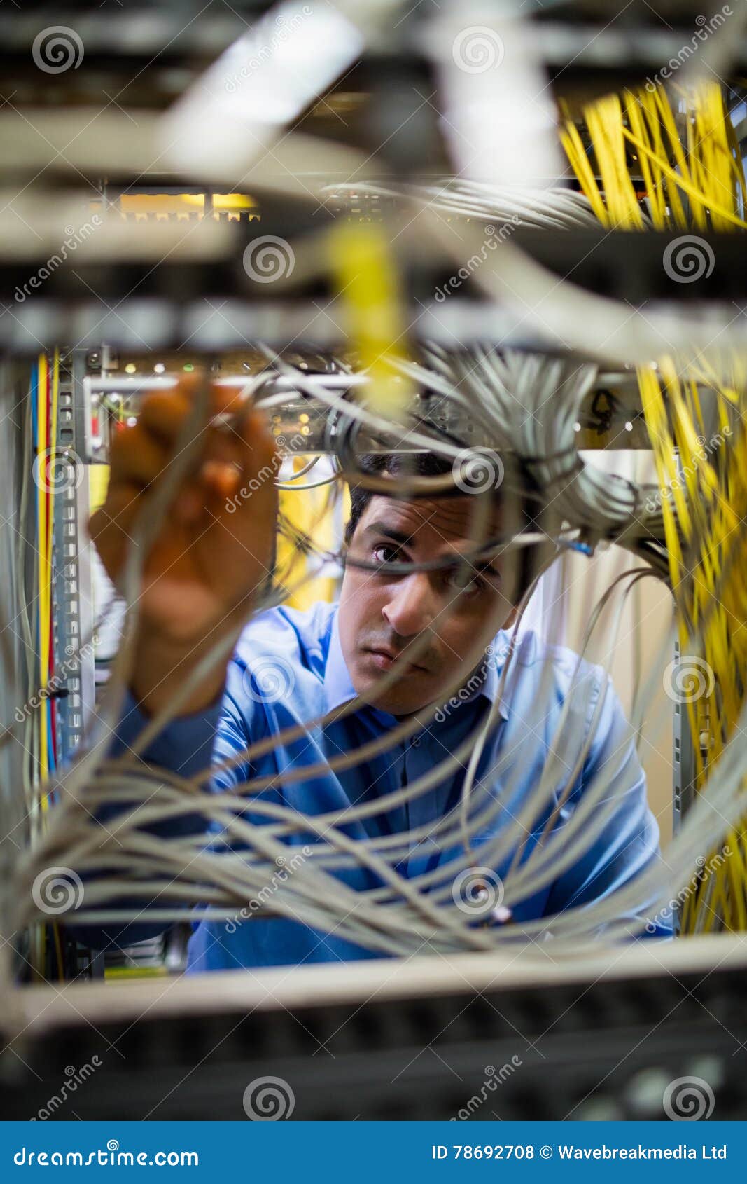 Technician fixing cable stock photo. Image of complex - 78692708