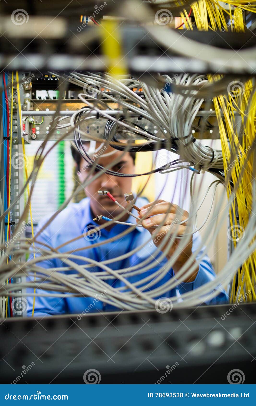 Technician fixing cable stock photo. Image of holding - 78693538