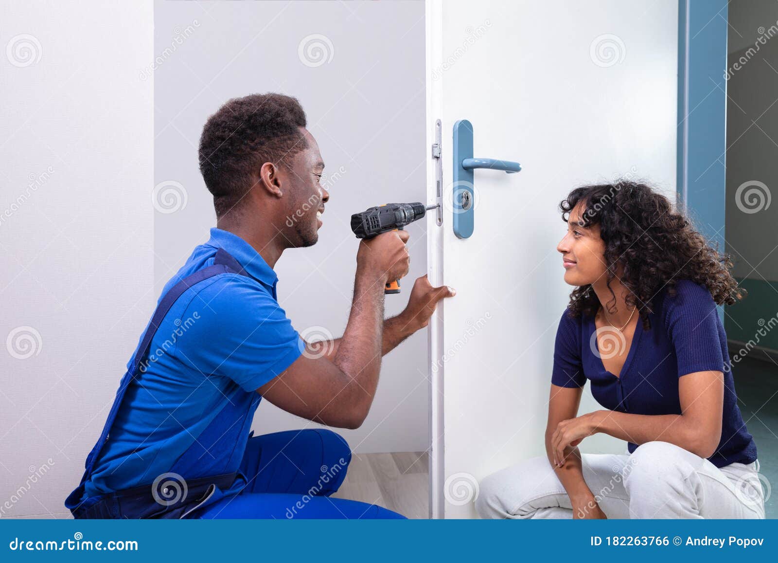 Technician Fixing the Door Lock Stock Photo - Image of manual, closeup ...