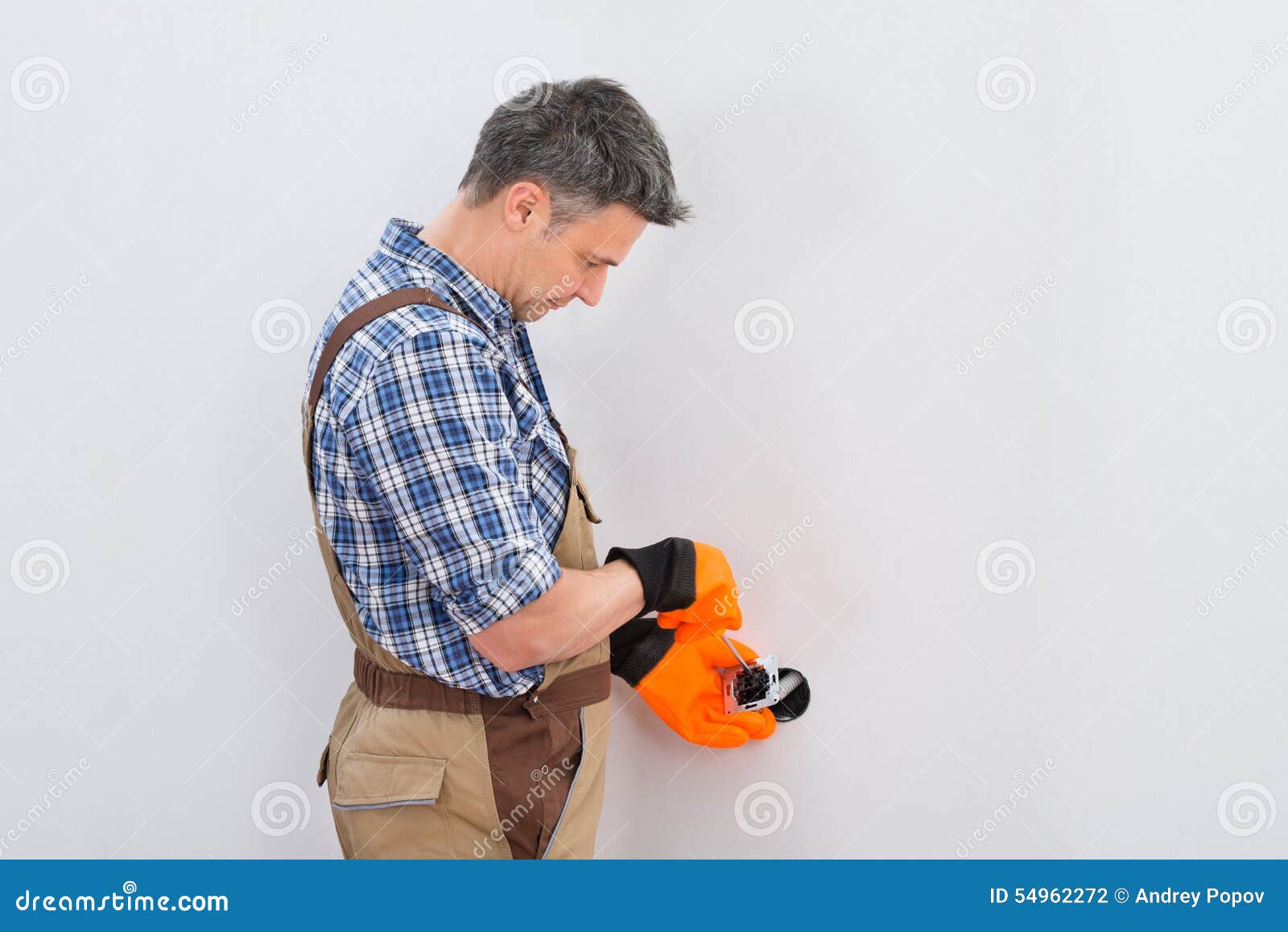 Technician Fixing Socket on Wall Stock Photo - Image of assembly ...
