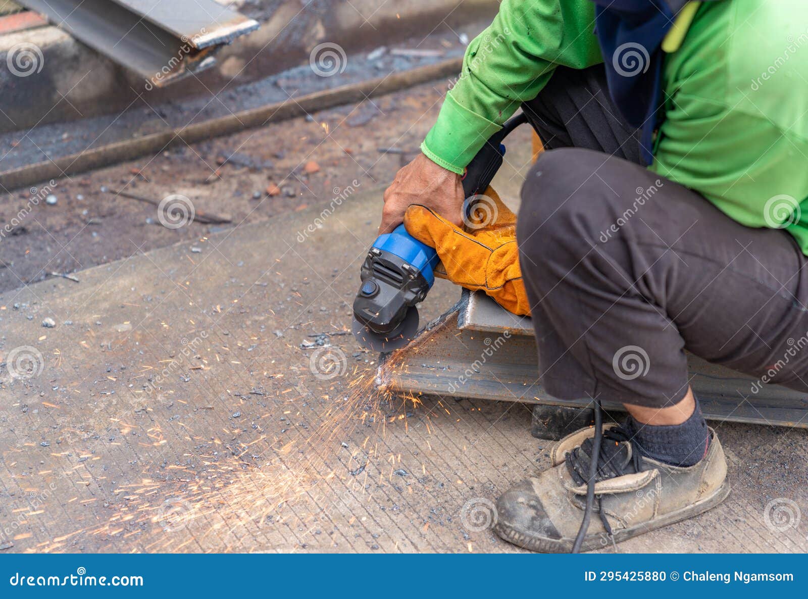 Technician Grinds 45 Degree Angles on Structural Support Beams Stock ...