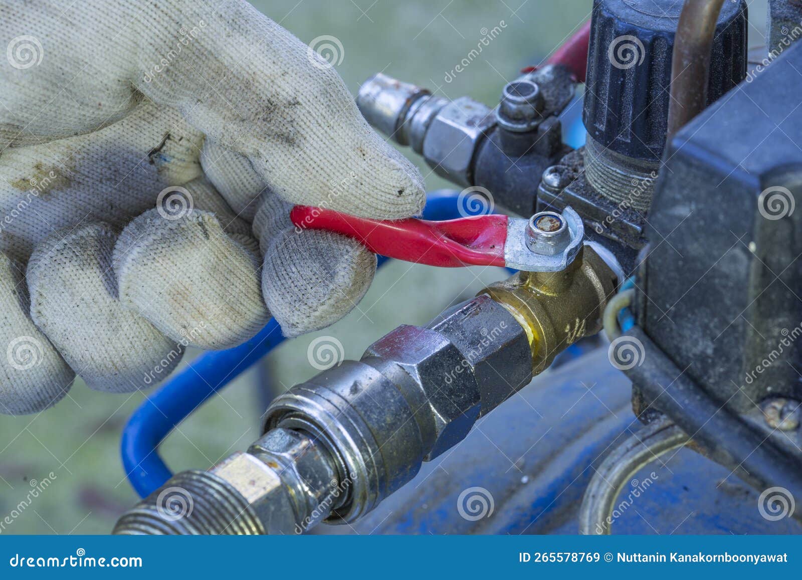 Technician Hand Holding Air Compressor Control Valve, Red Valve Stock ...