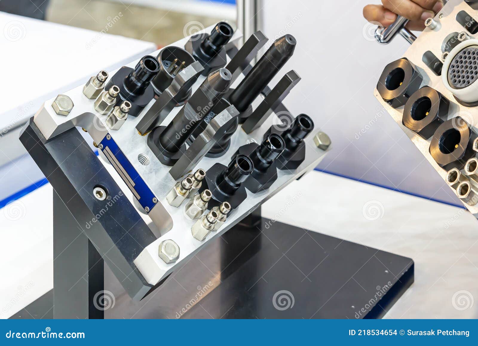 Technician Holding Assistance Mounting of Multi Coupling with ...
