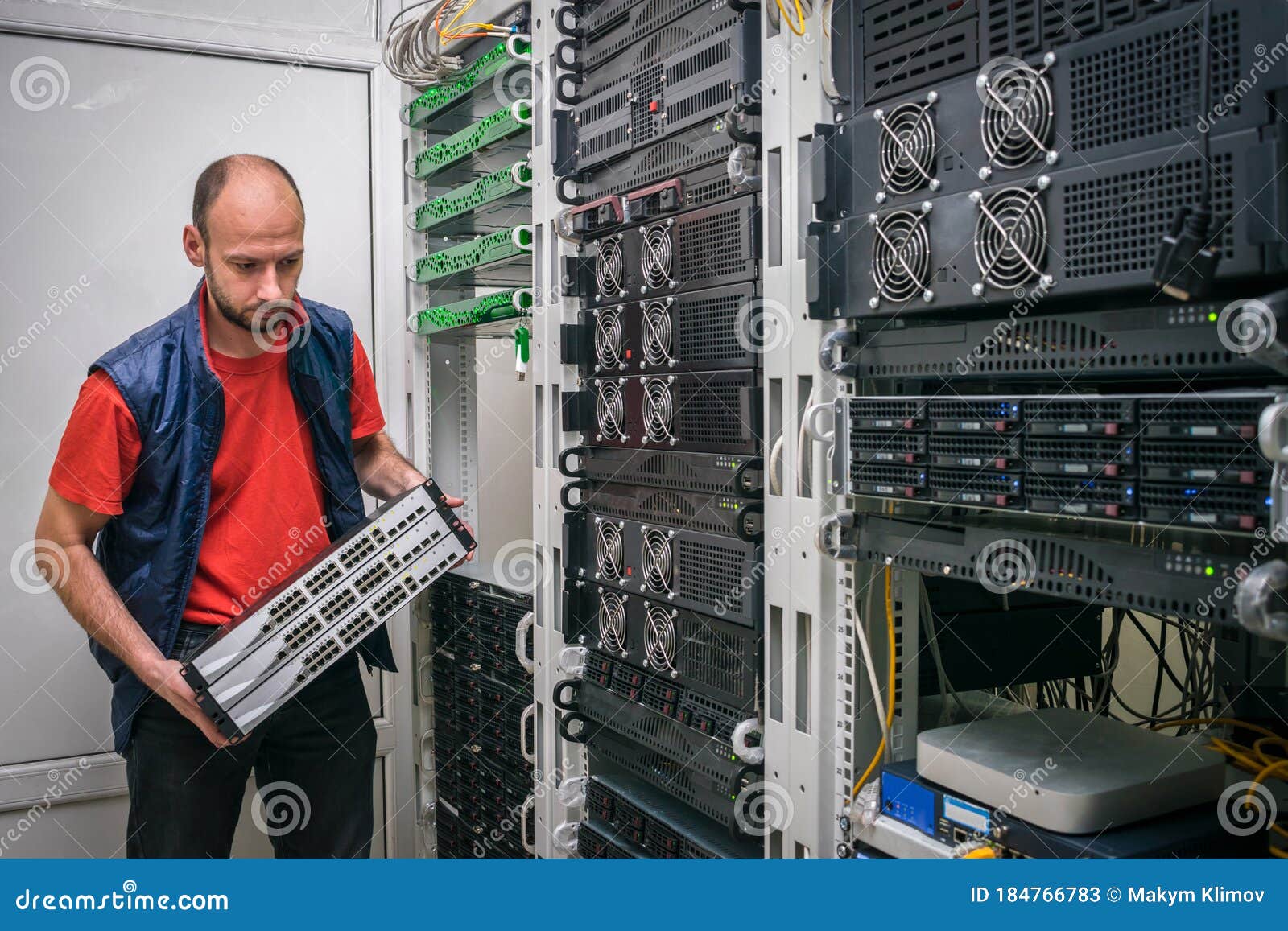 The Technician is Holding a Stack of Switches in His Hands for ... The Technician is Holding a Stack of Switches in His Hands for ...