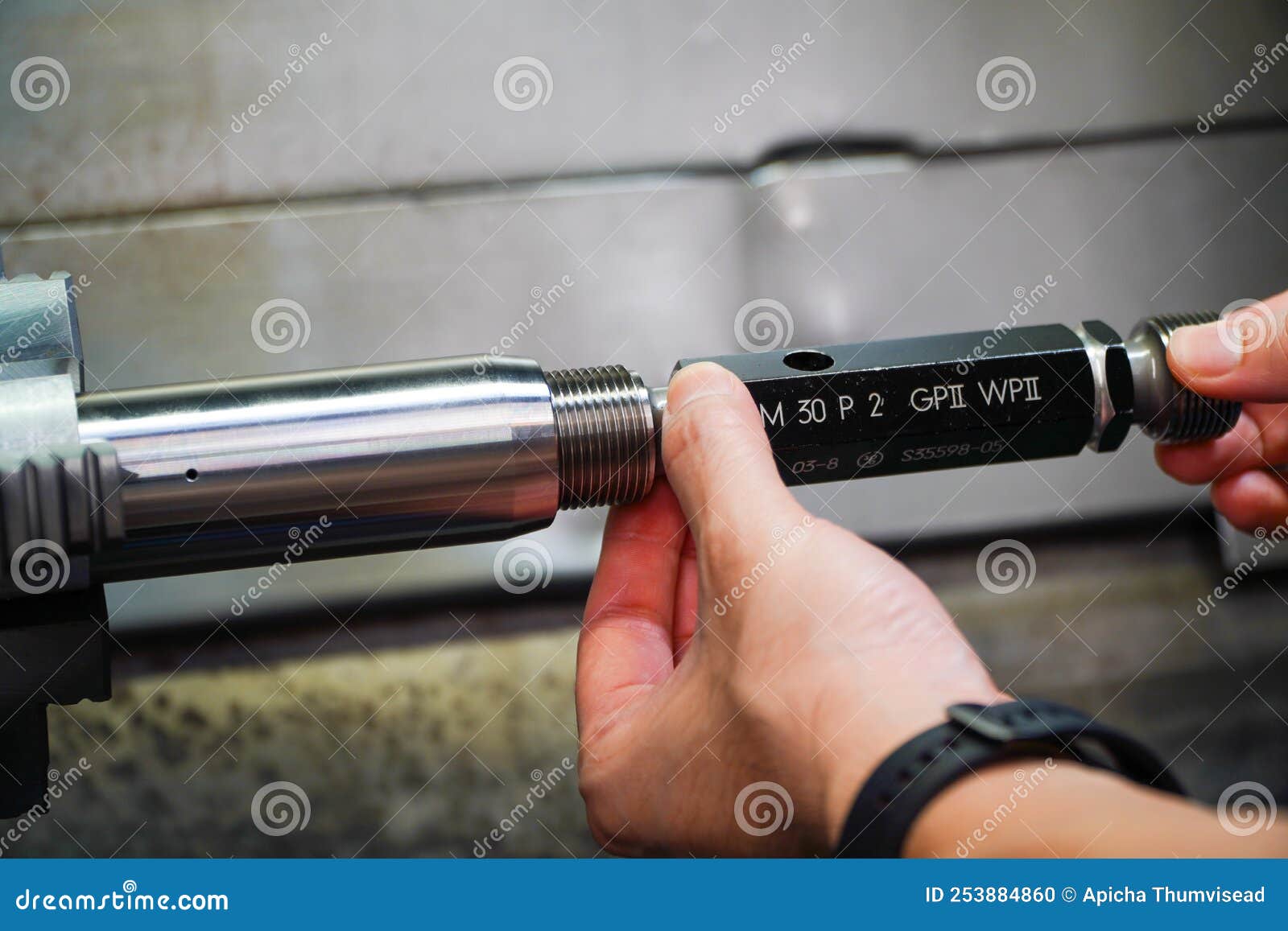 Technician Inspecting Industrial Threaded Plug Gauge Workpiece on White ...