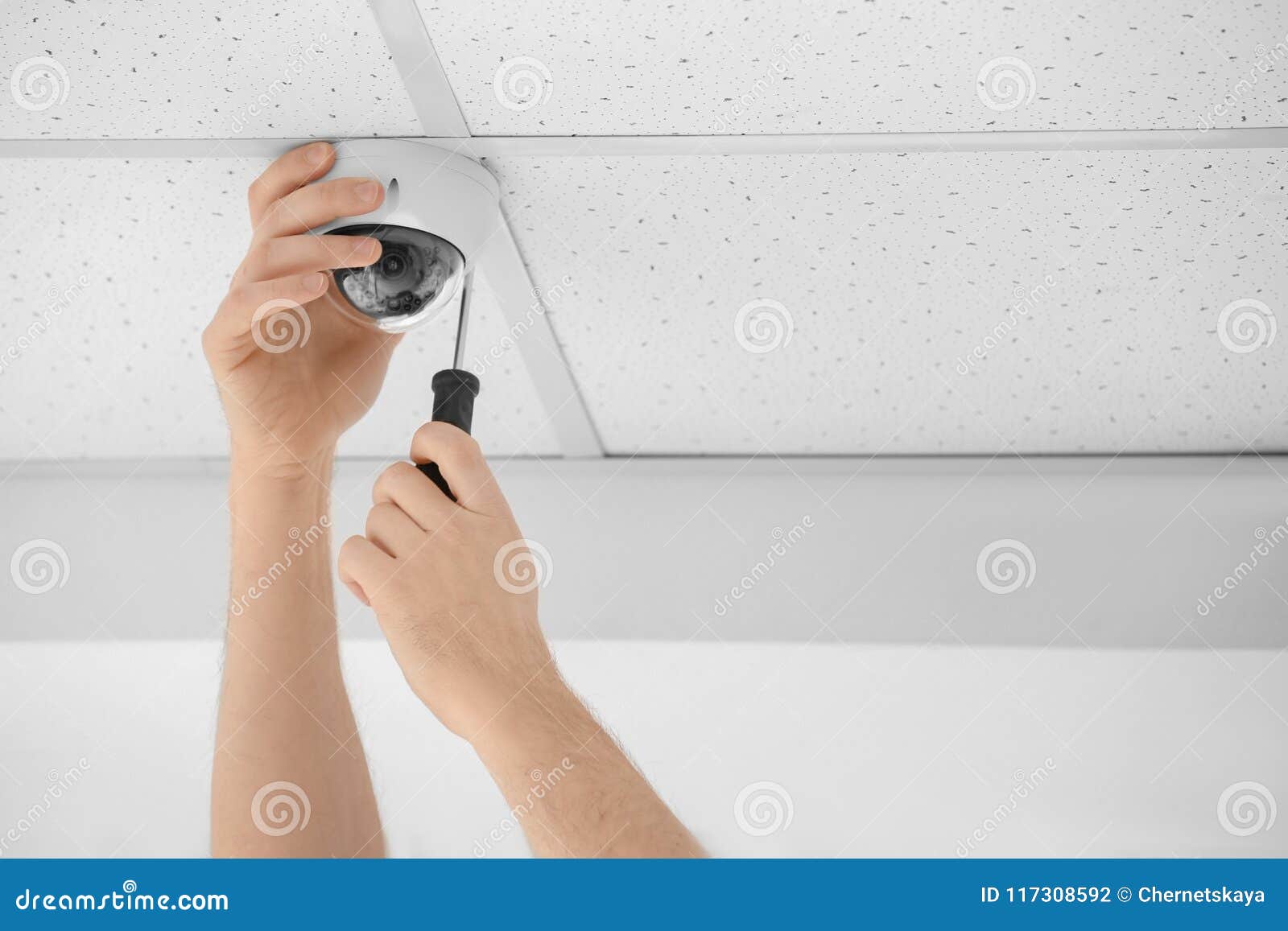 Technician Installing CCTV Camera on Ceiling Indoors Stock Photo ...