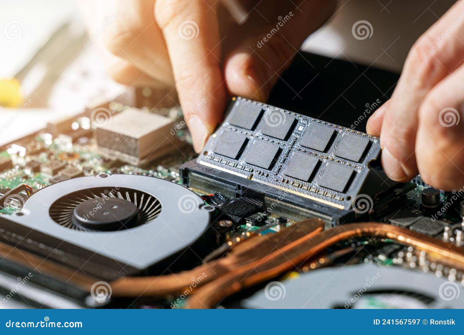 Technician Installing Ram Memory Module in Laptop Motherboard. Computer ...
