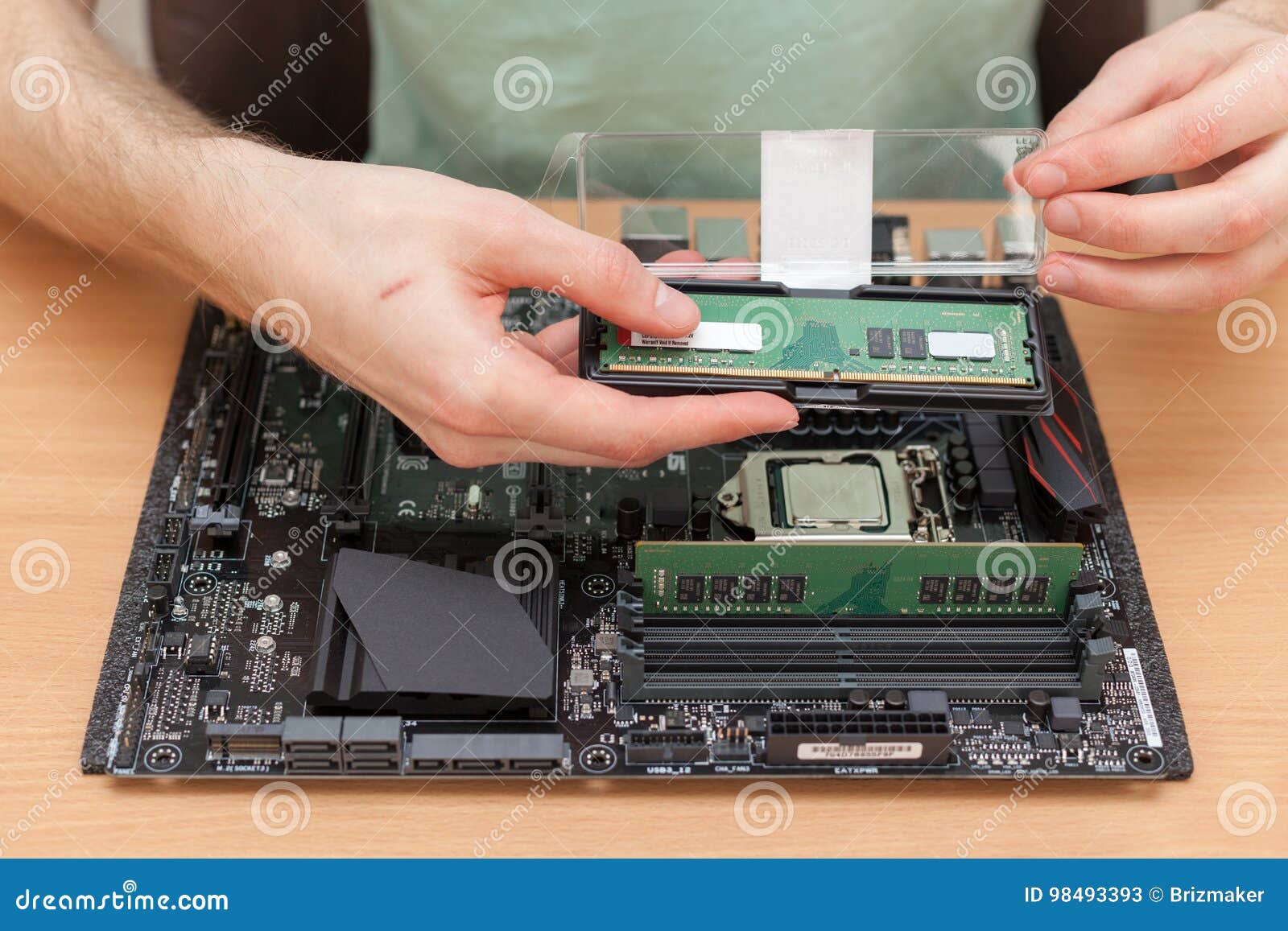 Technician Installing Random Access Memory into PC. Stock Image - Image ... Technician Installing Random Access Memory into PC. Stock Image - Image ...