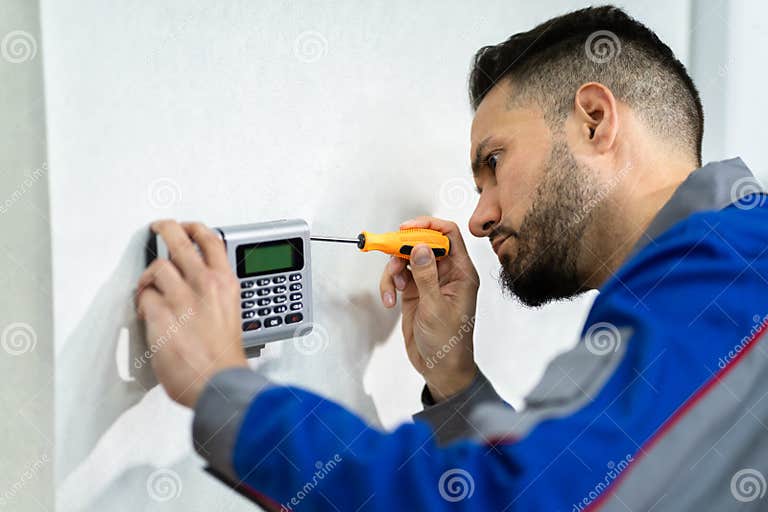 Technician Installing Security Access Alarm System Stock Photo - Image ...