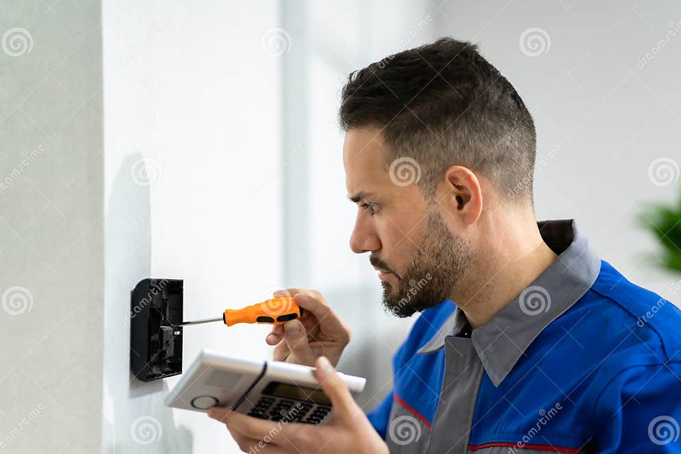 Technician Installing Security Access Alarm System Stock Photo - Image ...