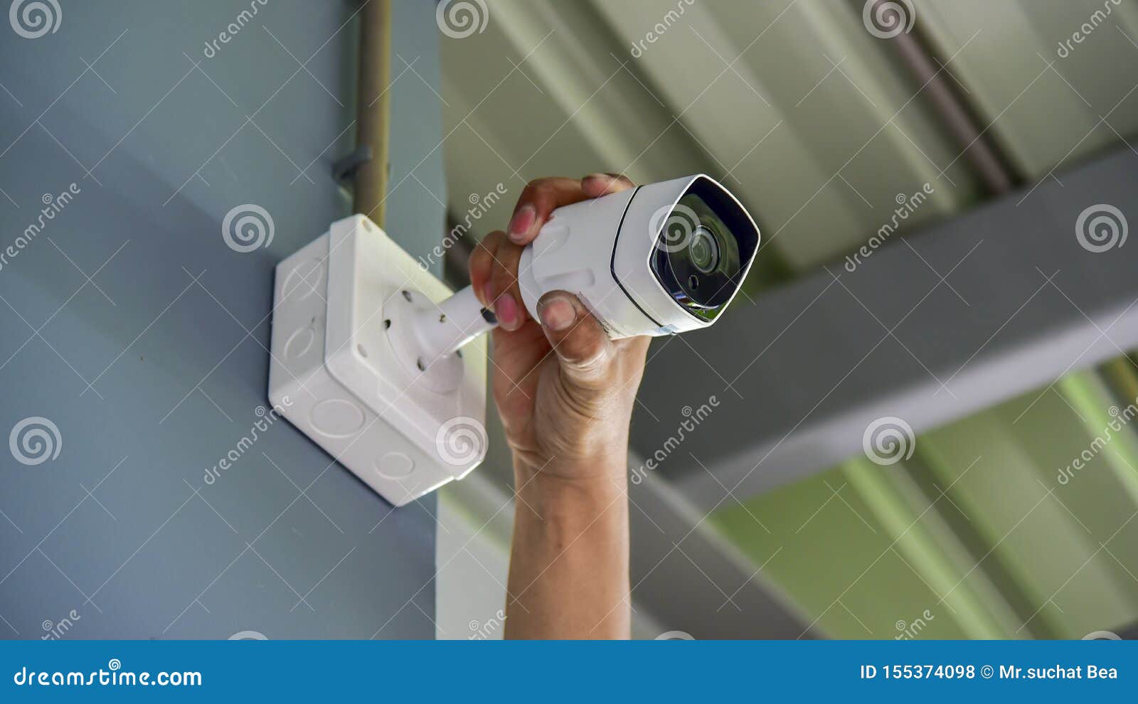 Technician Installing Wireless CCTV Camera by Screwed for Home Security ...
