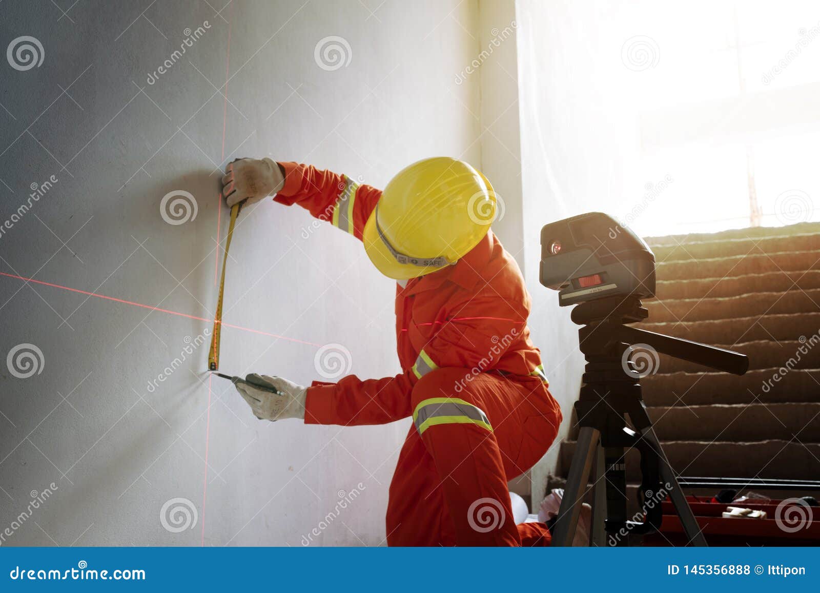Technician with Laser Measurement Level Stock Photo - Image of ...