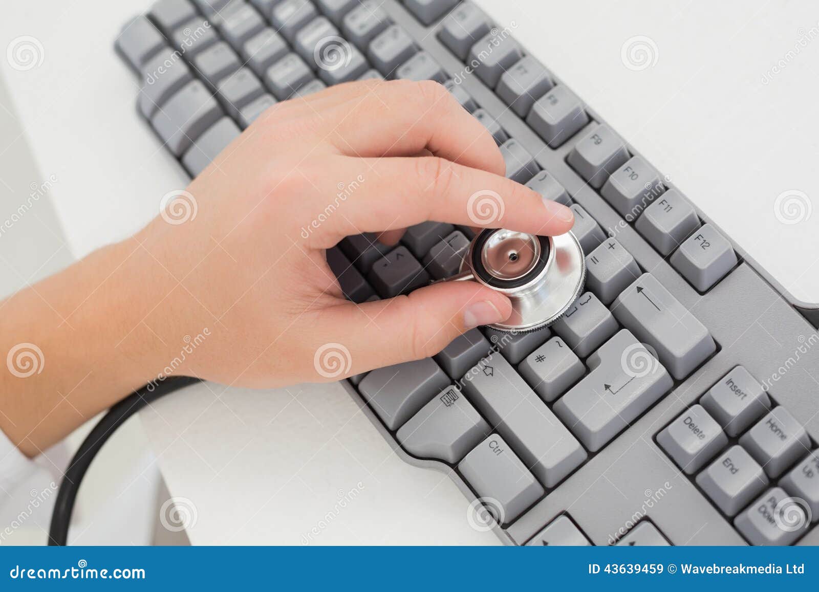 Technician Listening To Keyboard with Stethoscope Stock Image - Image ...