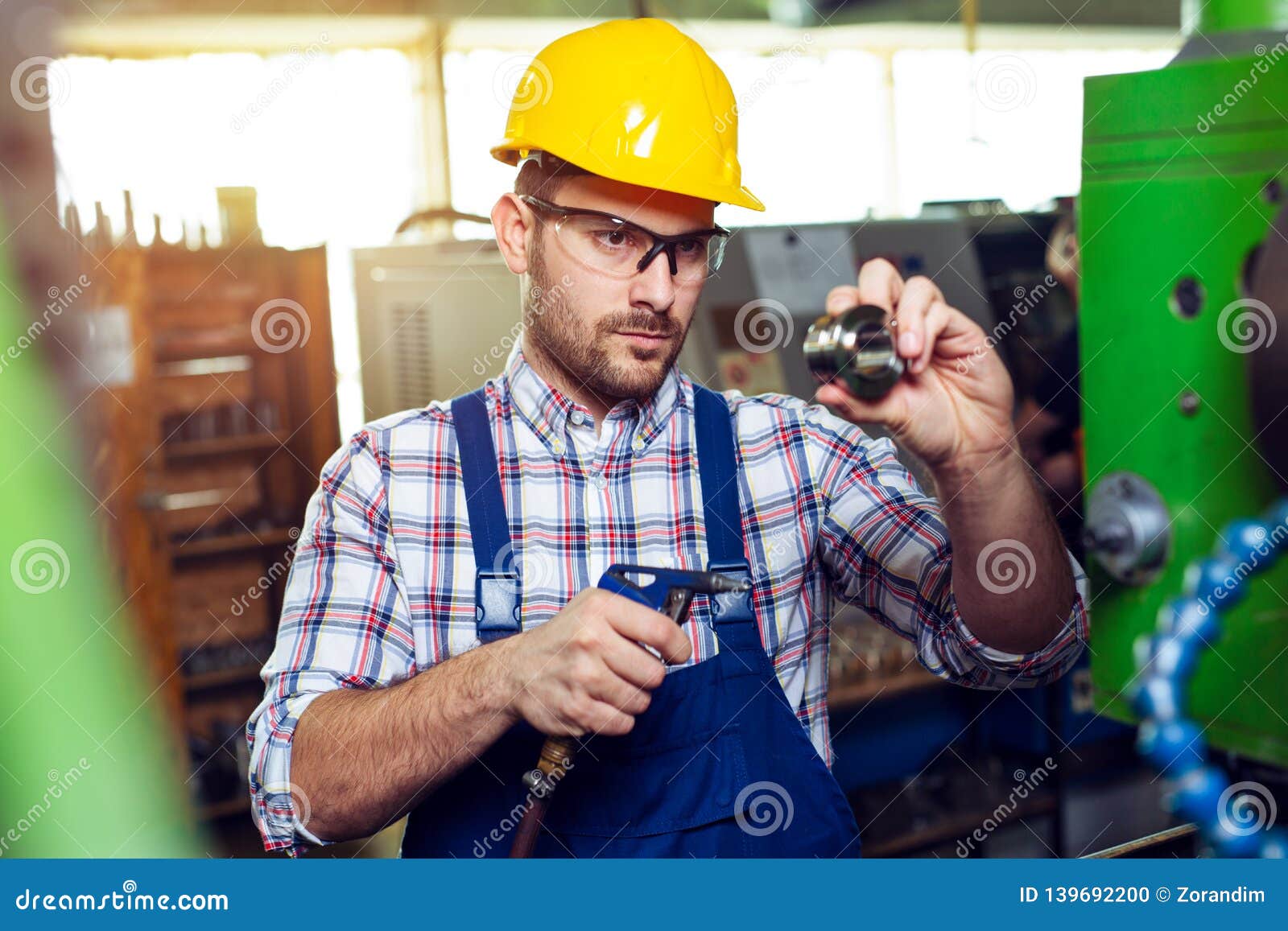 Technician Looking at Detail at Manufacturing Stock Photo - Image of ...