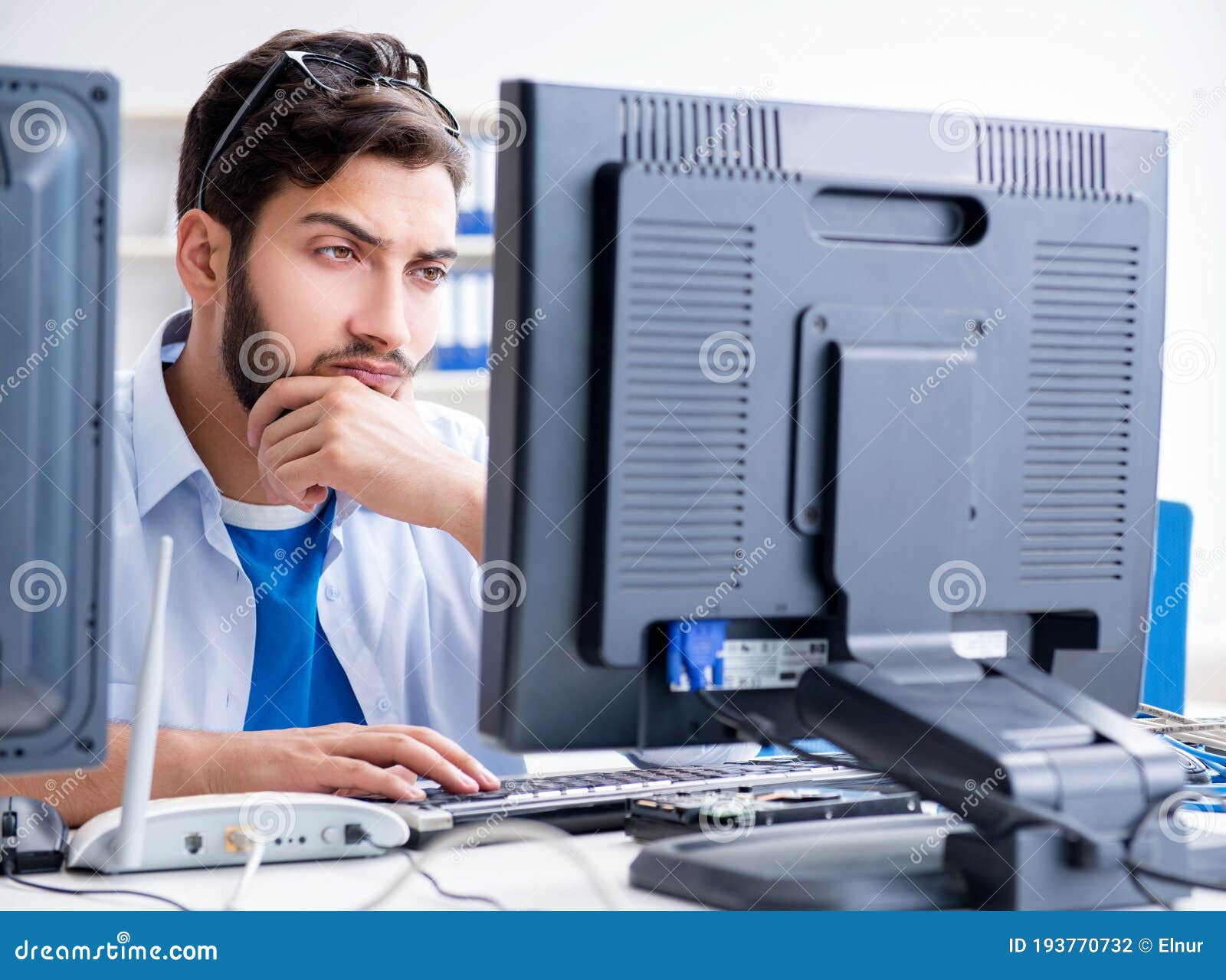 It Technician Looking at it Equipment Stock Photo - Image of company ...