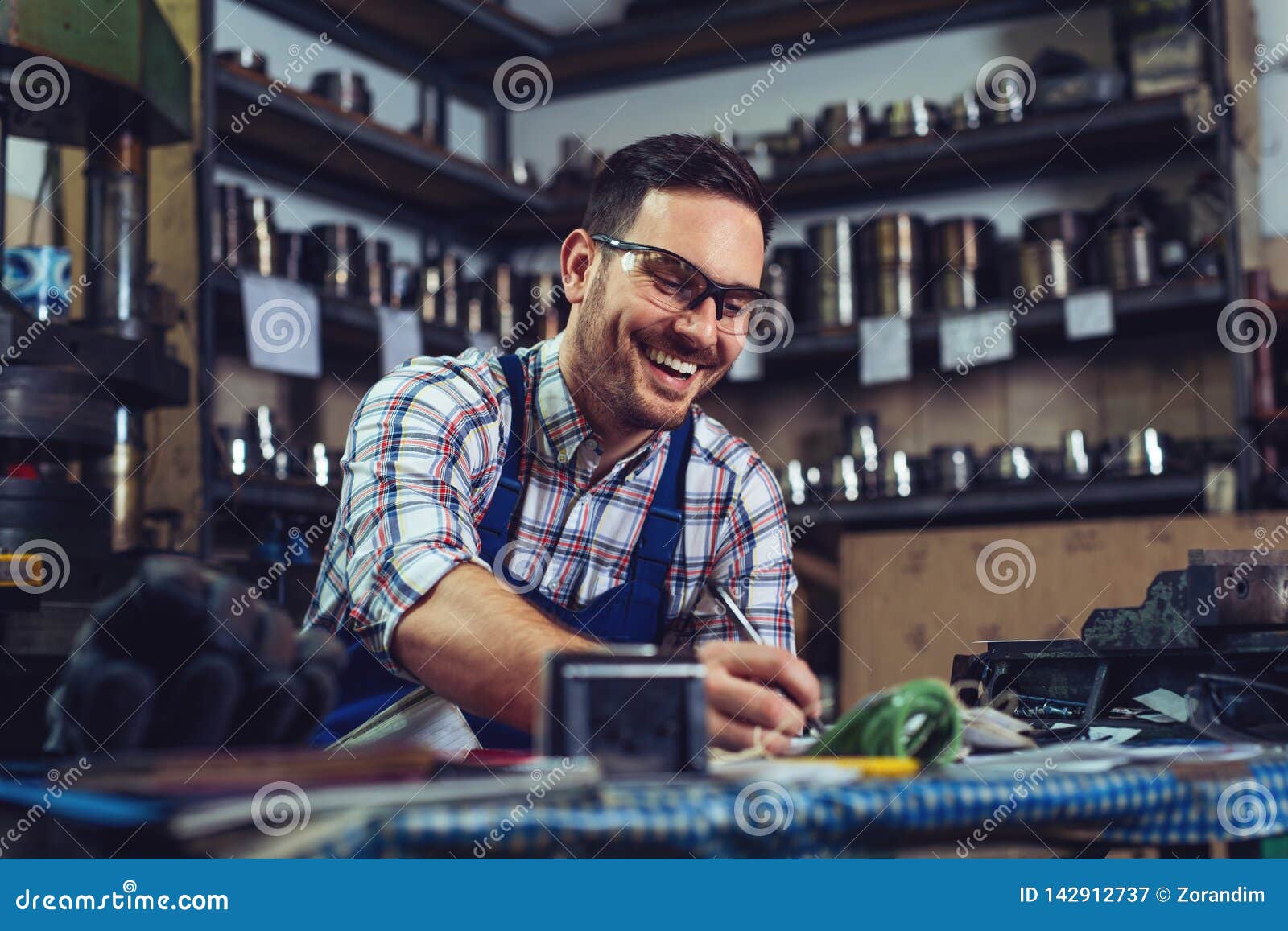 Technician Makes a Quality Control of Metal Pieces in a Metal ...