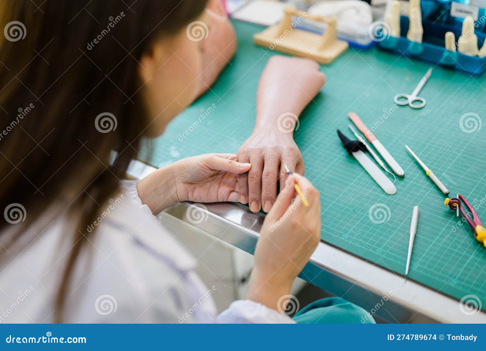 Technician Making and Checking Prosthetic Limb at Prosthetic Workshop ...