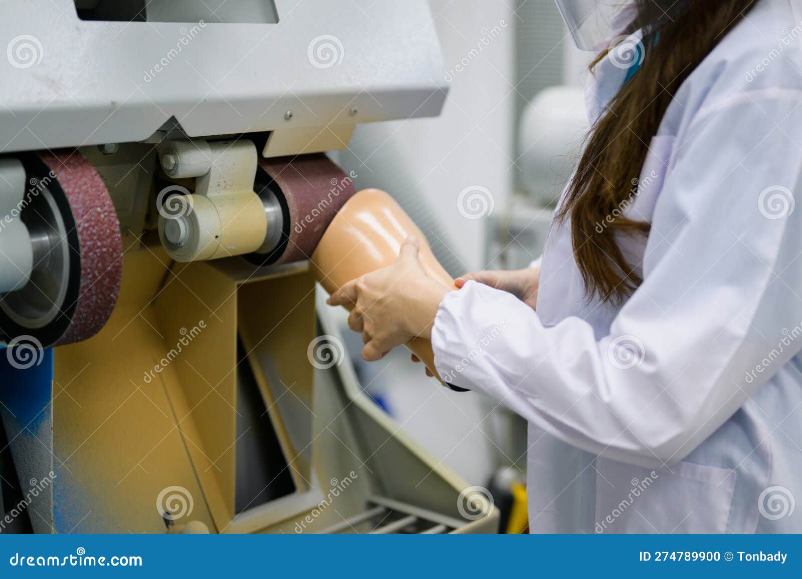 Technician Making Prosthetic Limb Using Grinder To Smooth Socket Stock ...