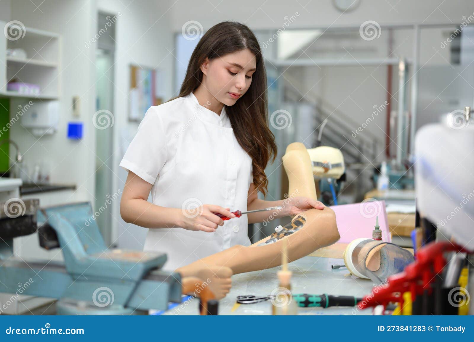 Technician Making Prototype of Prosthetic Leg, Artificial Metal Limb ...