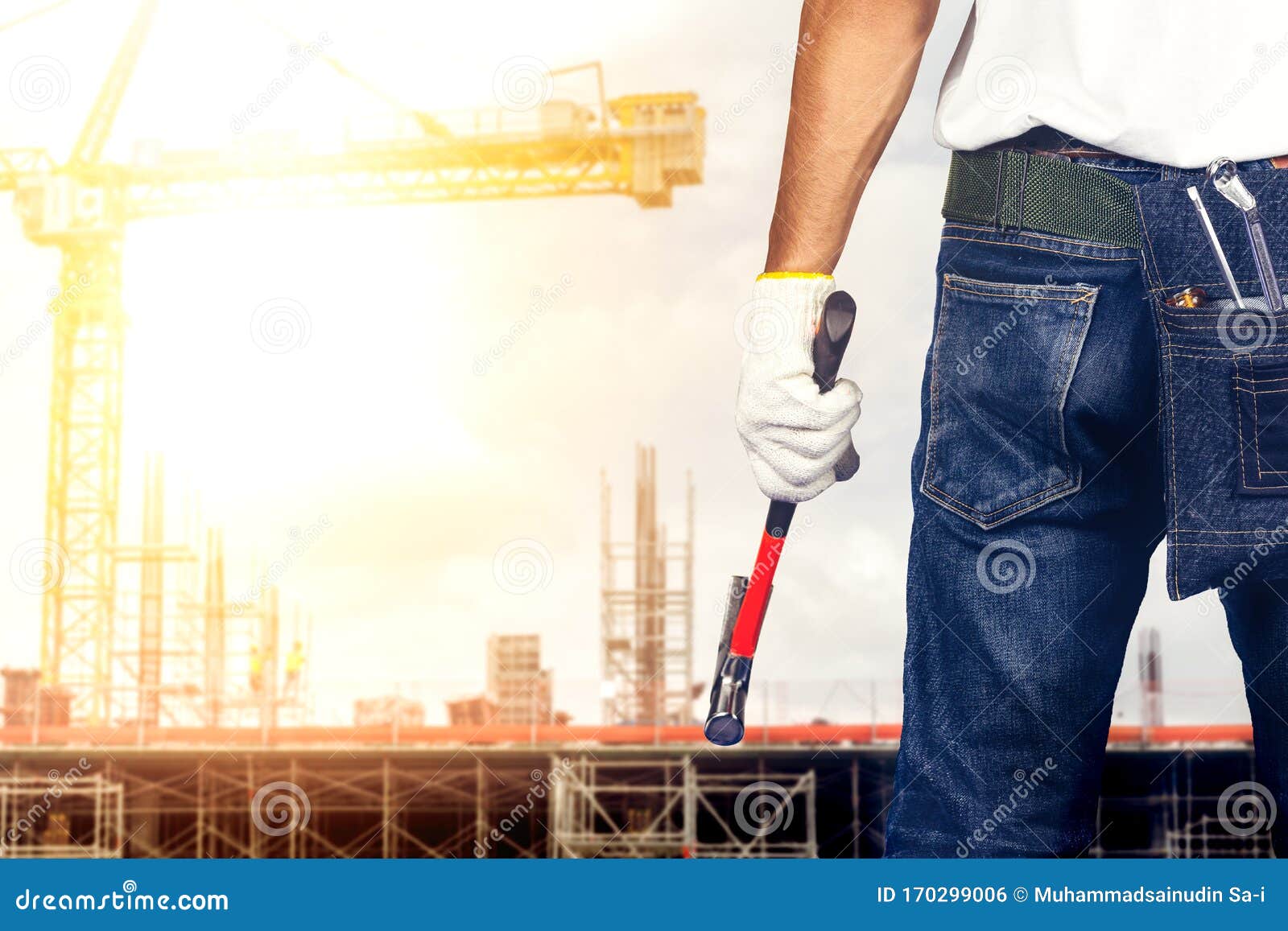 Engineer Holding Hammer Standing on Construction Site Stock Photo ...