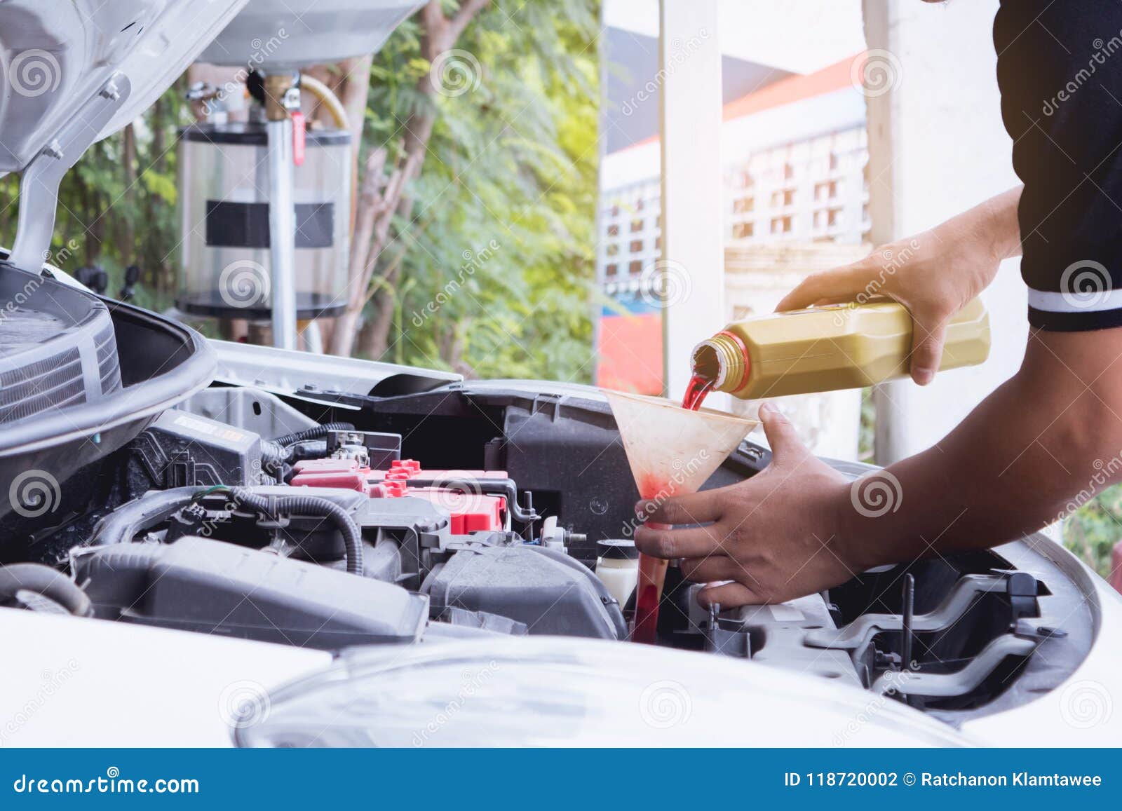 Technician Man Fill Oil To the Engine. Stock Photo - Image of filling ...