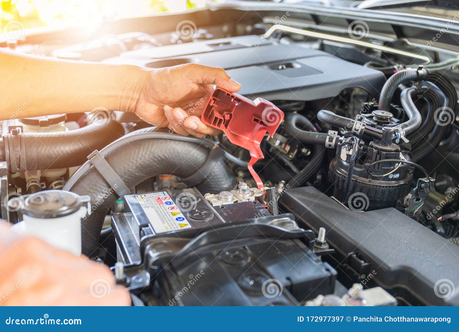 Technician Man Hand Checking Car Battery on Car Engine System Stock ...