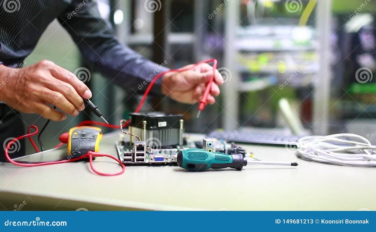 Technician Man Hand Using Screwdriver and Digital Multimeter Probe To ...