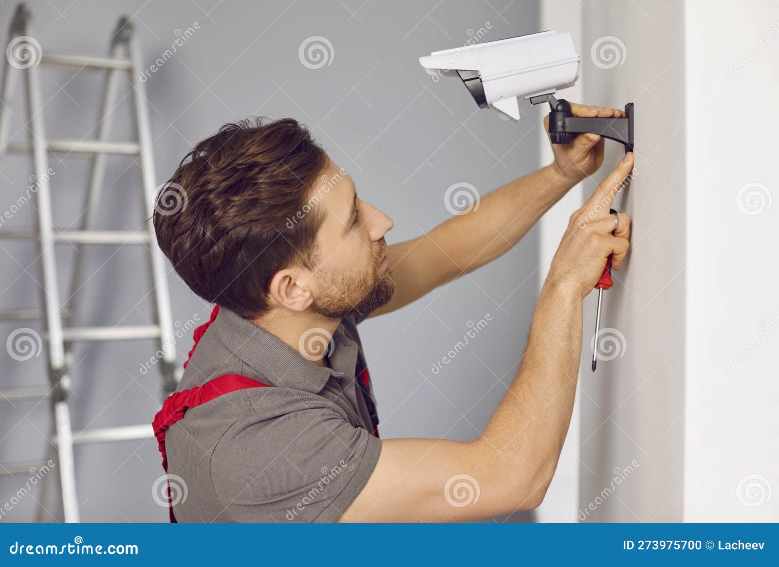 Technician Man Installing Wireless CCTV Camera on Wall Stock Photo ...
