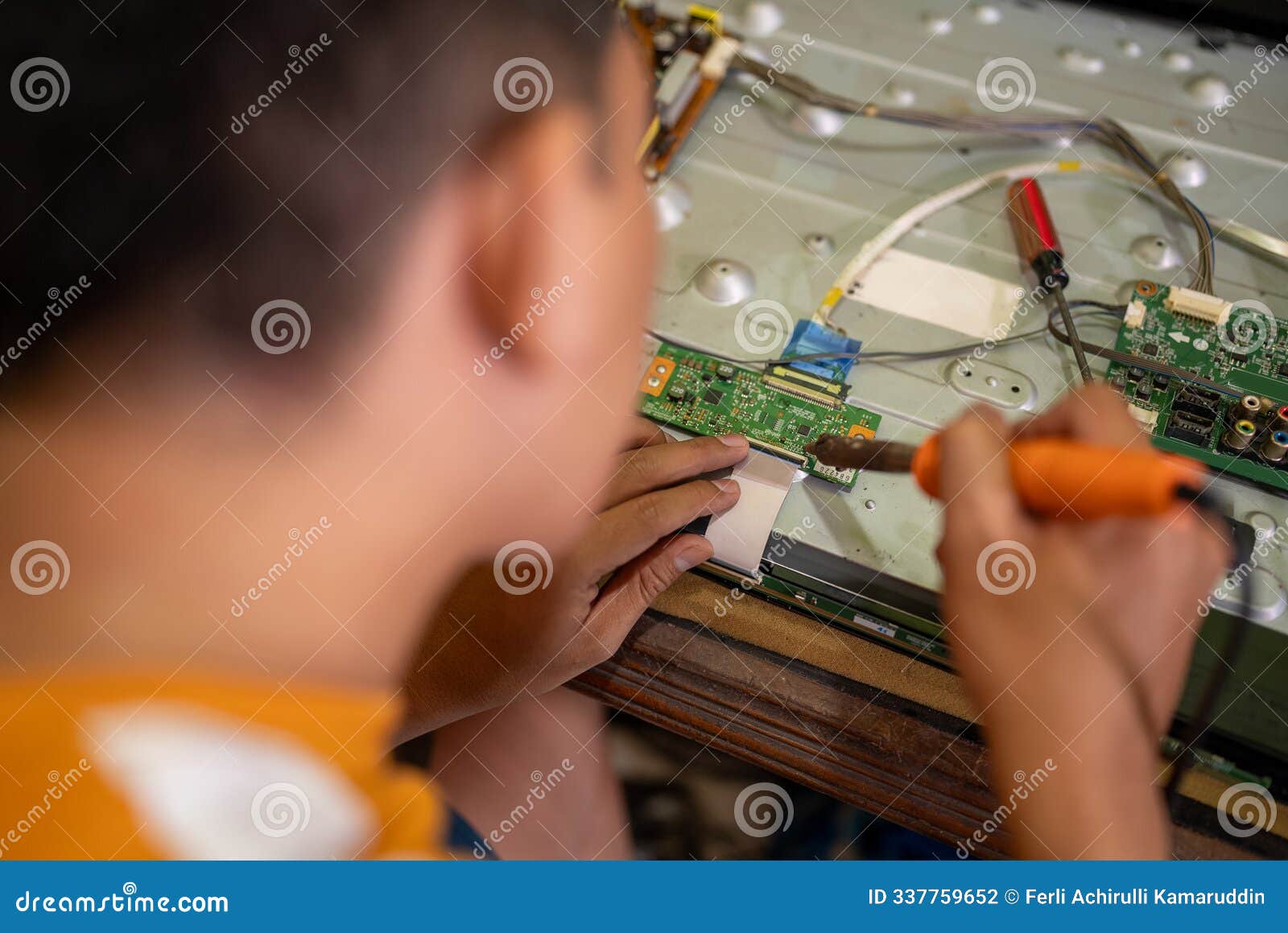 Technician Man Uses Soldering Iron To Replace Electronic Component ...