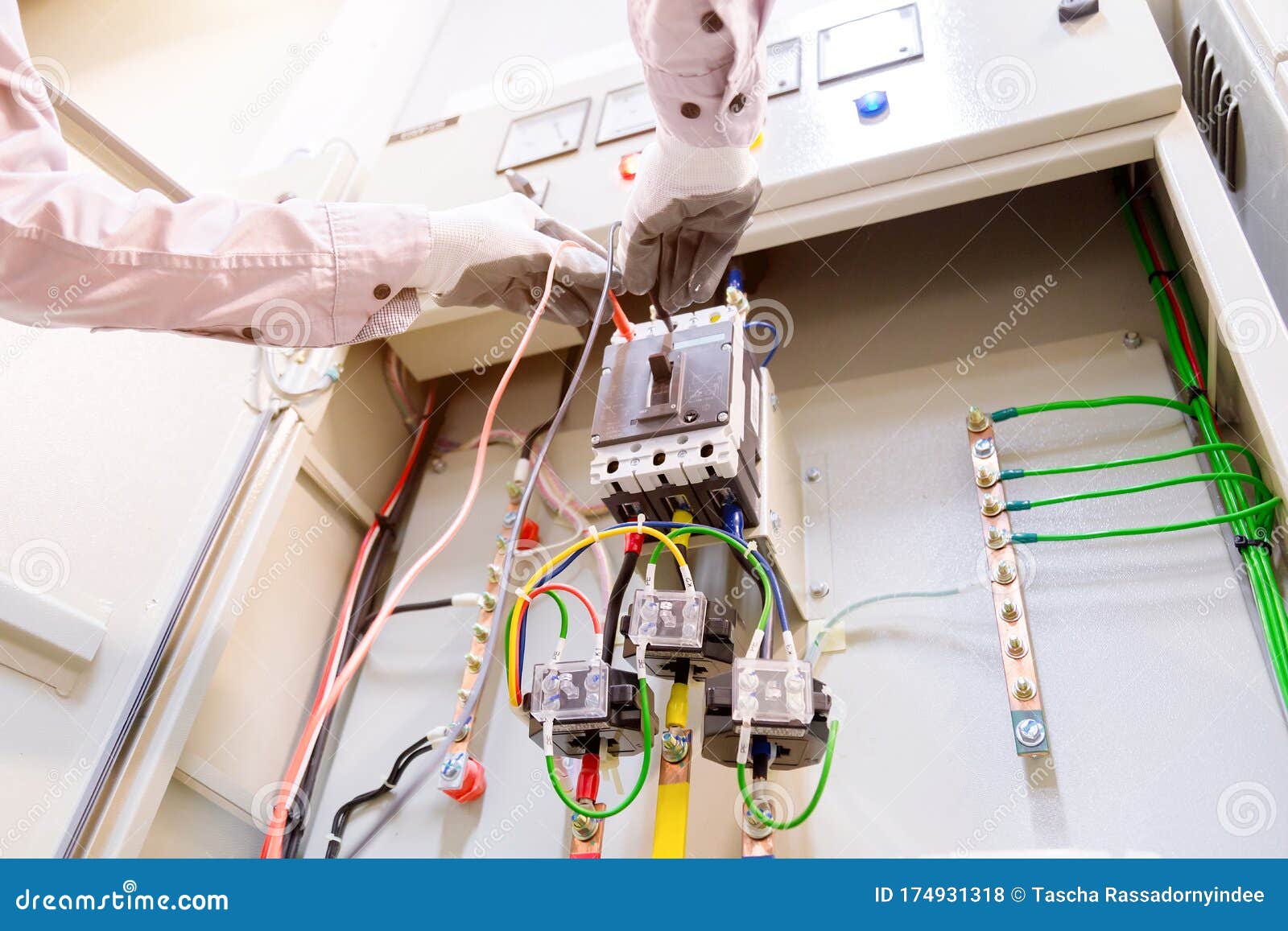 Technician is Measuring Voltage or Current by Voltmeter in Control ...