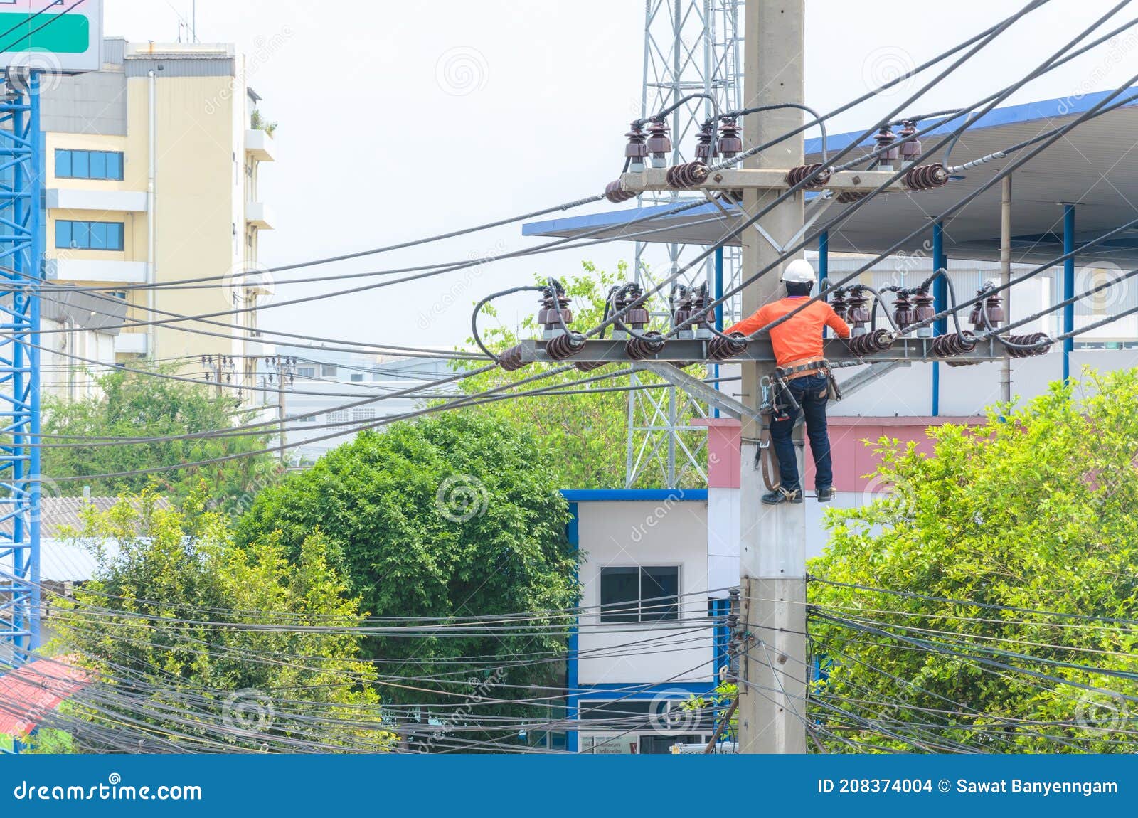 Technician Men Fixing or Repairing Broken Power Line on Electric Pole ...