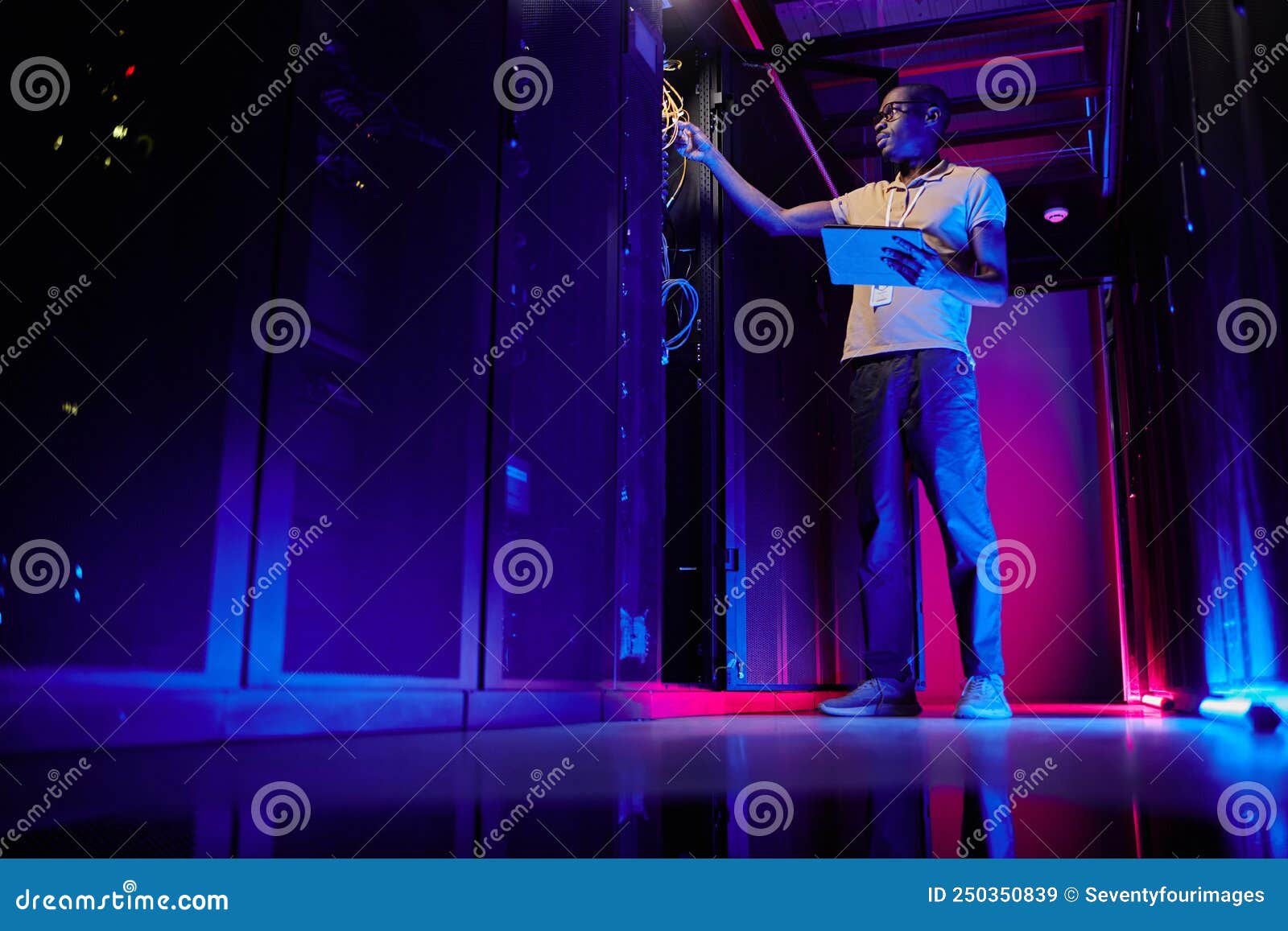 Technician in Neon Server Room Stock Image - Image of adult, support ...