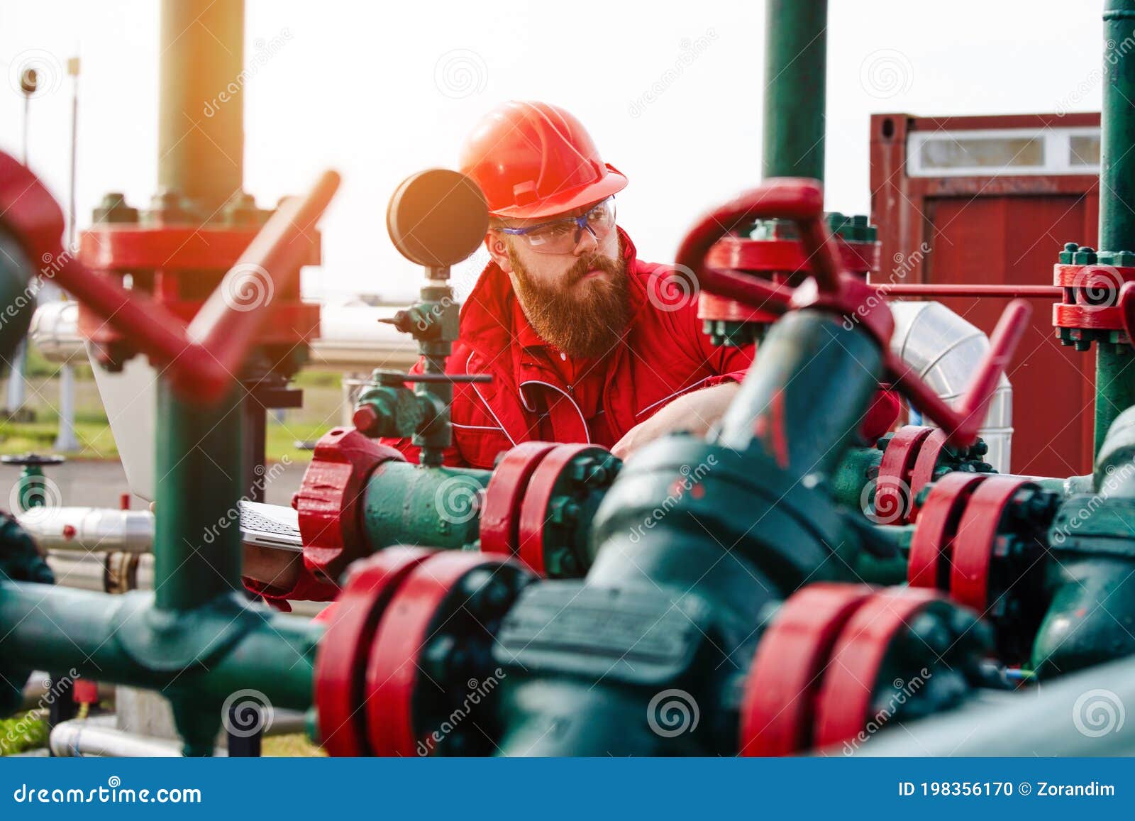 Technician in Oil and Gas Refinery. Worker in Oil Refinery Stock Photo ...