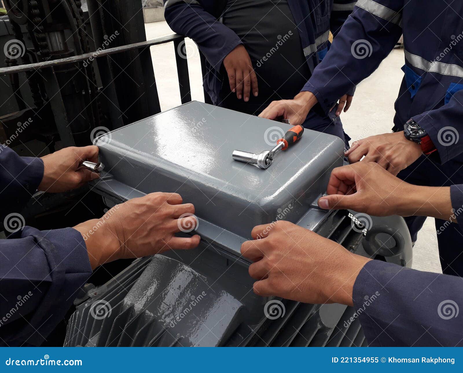 Technician Open Box Of Electric Motor For Inspection And Insulation ...