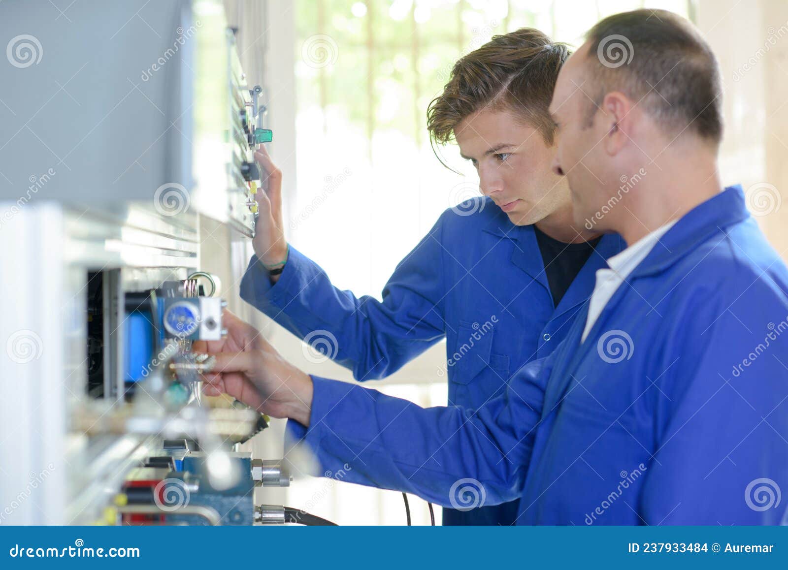 Technician Operating Advanced Technology Stock Photo - Image of ...