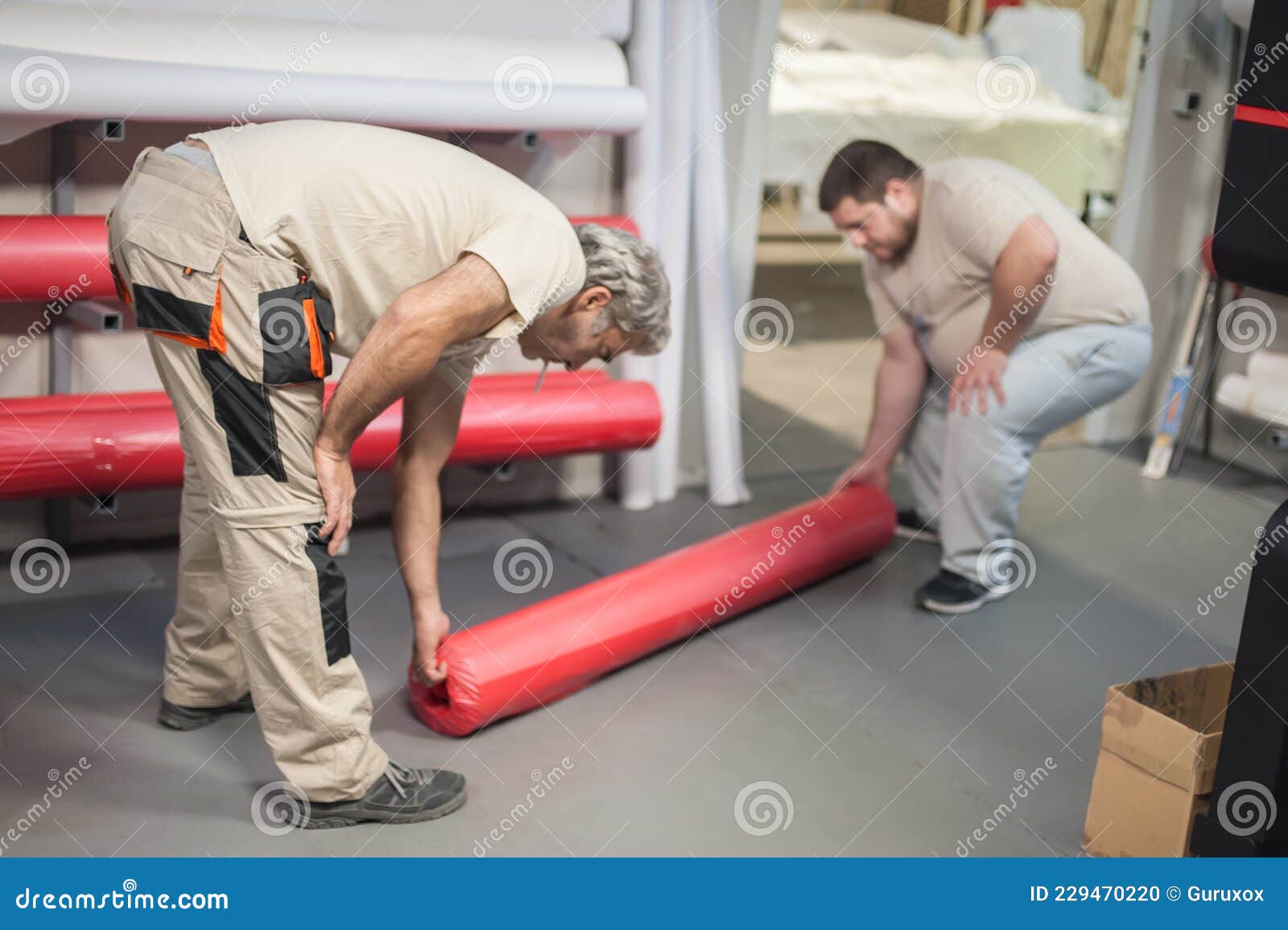 Technician Operator Changes Paper Roll on Large Printer Plotter Machine ... Technician Operator Changes Paper Roll on Large Printer Plotter Machine ...