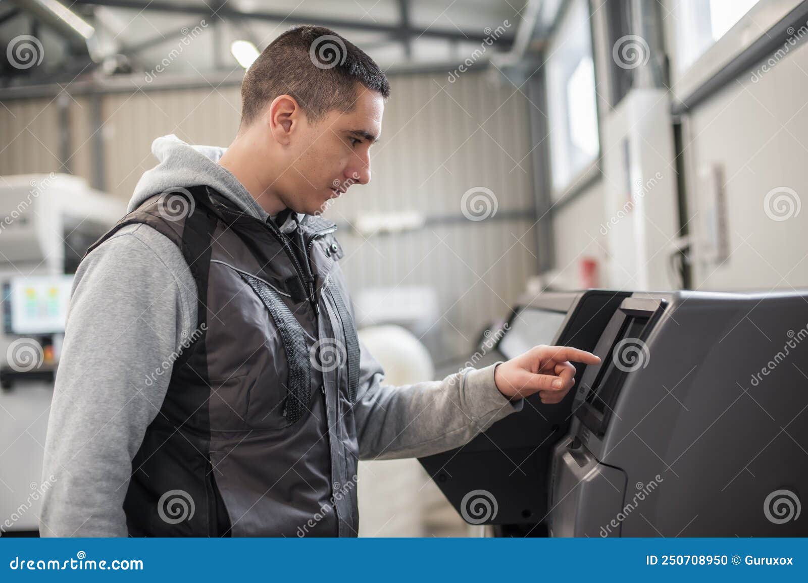 Technician Operator Checking Status on Touchscreen Front Display ... Technician Operator Checking Status on Touchscreen Front Display ...