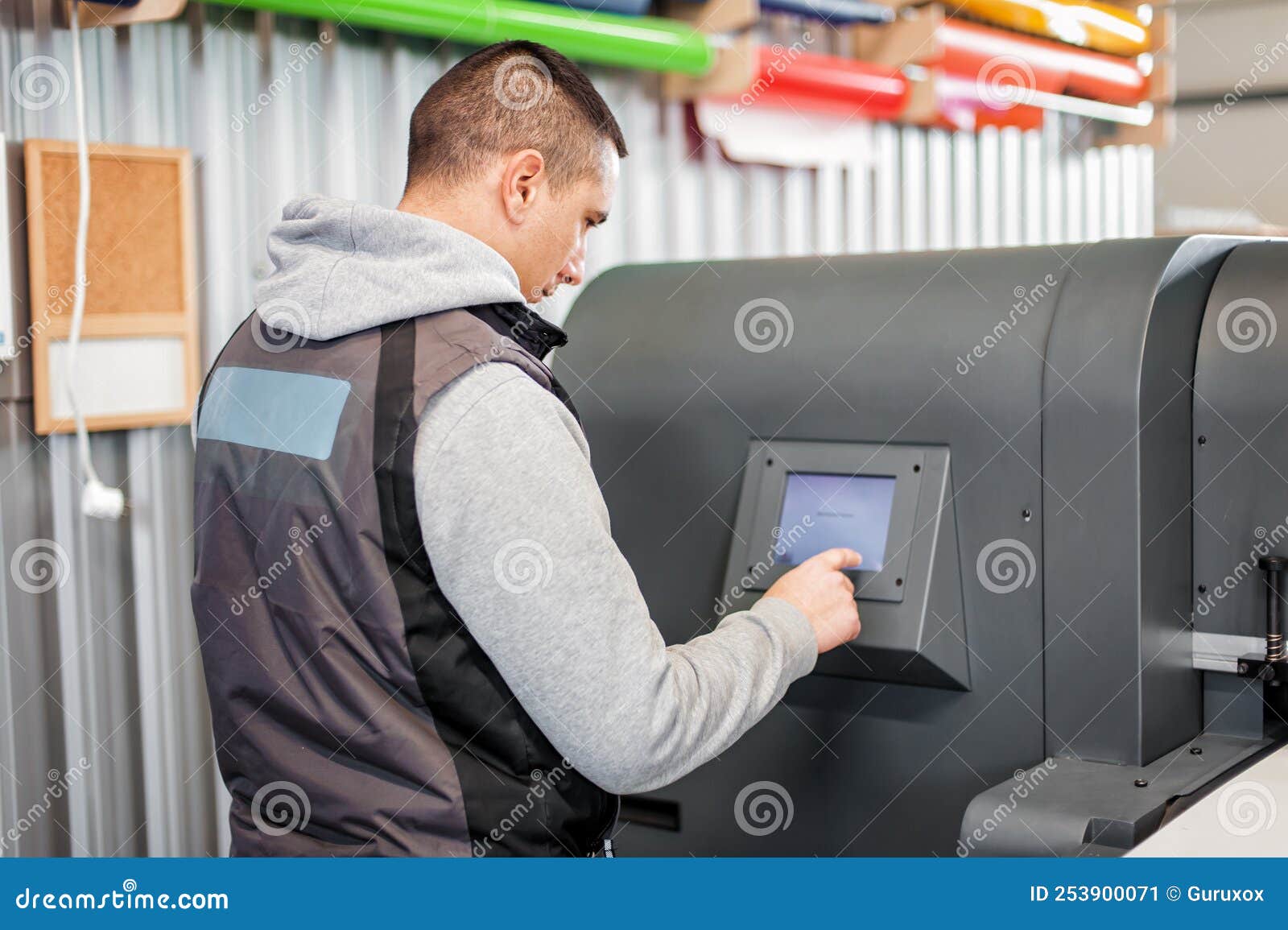 Technician Operator Checking Status on Touchscreen Front Display ... Technician Operator Checking Status on Touchscreen Front Display ...