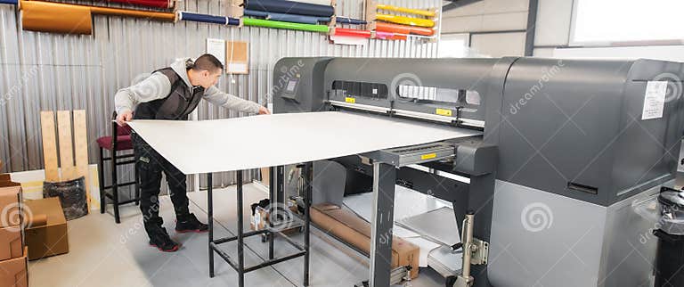 Technician Operator Works on Large Premium Industrial Printer Plotter ...