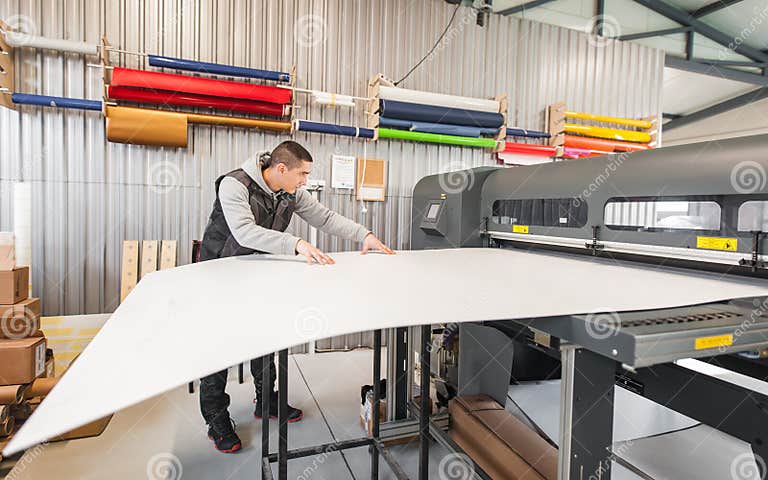 Technician Operator Works on Large Premium Industrial Printer Plotter ...