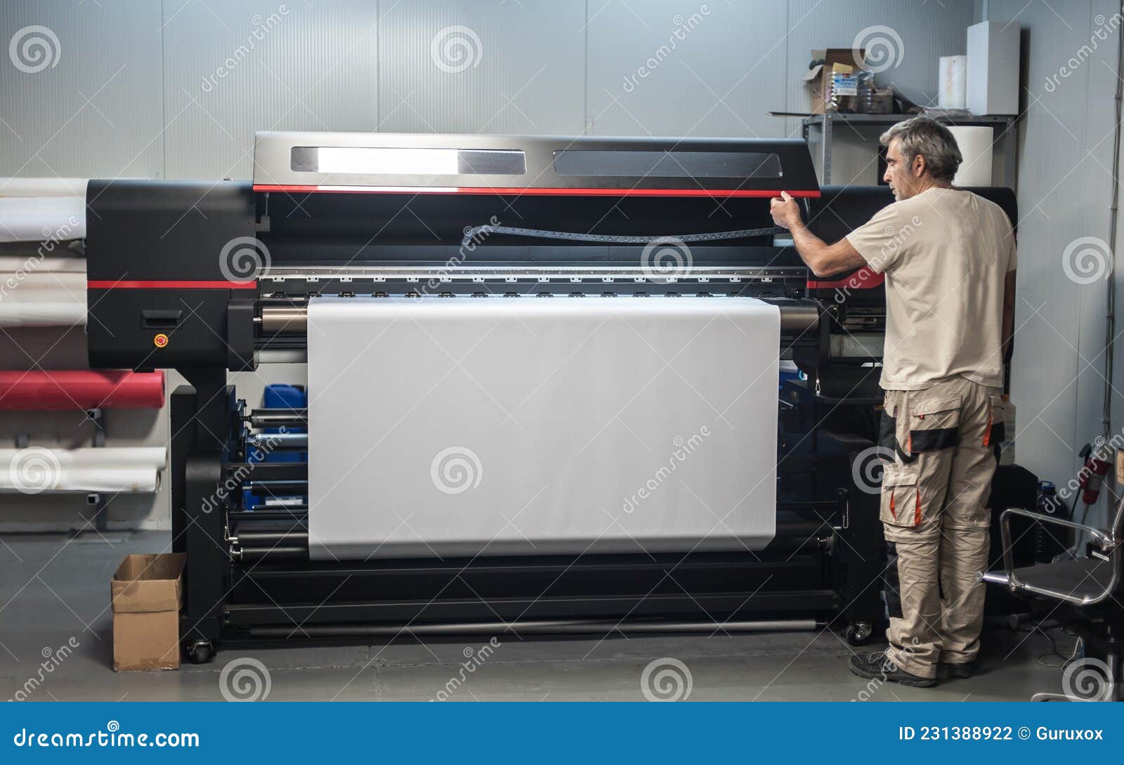 Technician Operator Works on Large Premium Industrial Printer Plotter ...