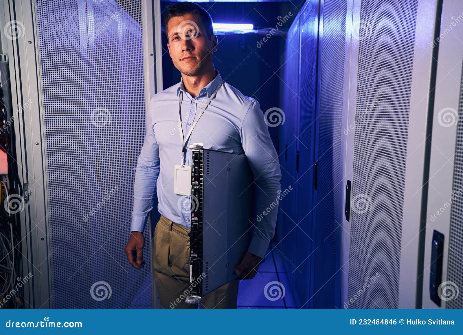 It Technician Posing for Camera in Workplace Stock Photo - Image of ...