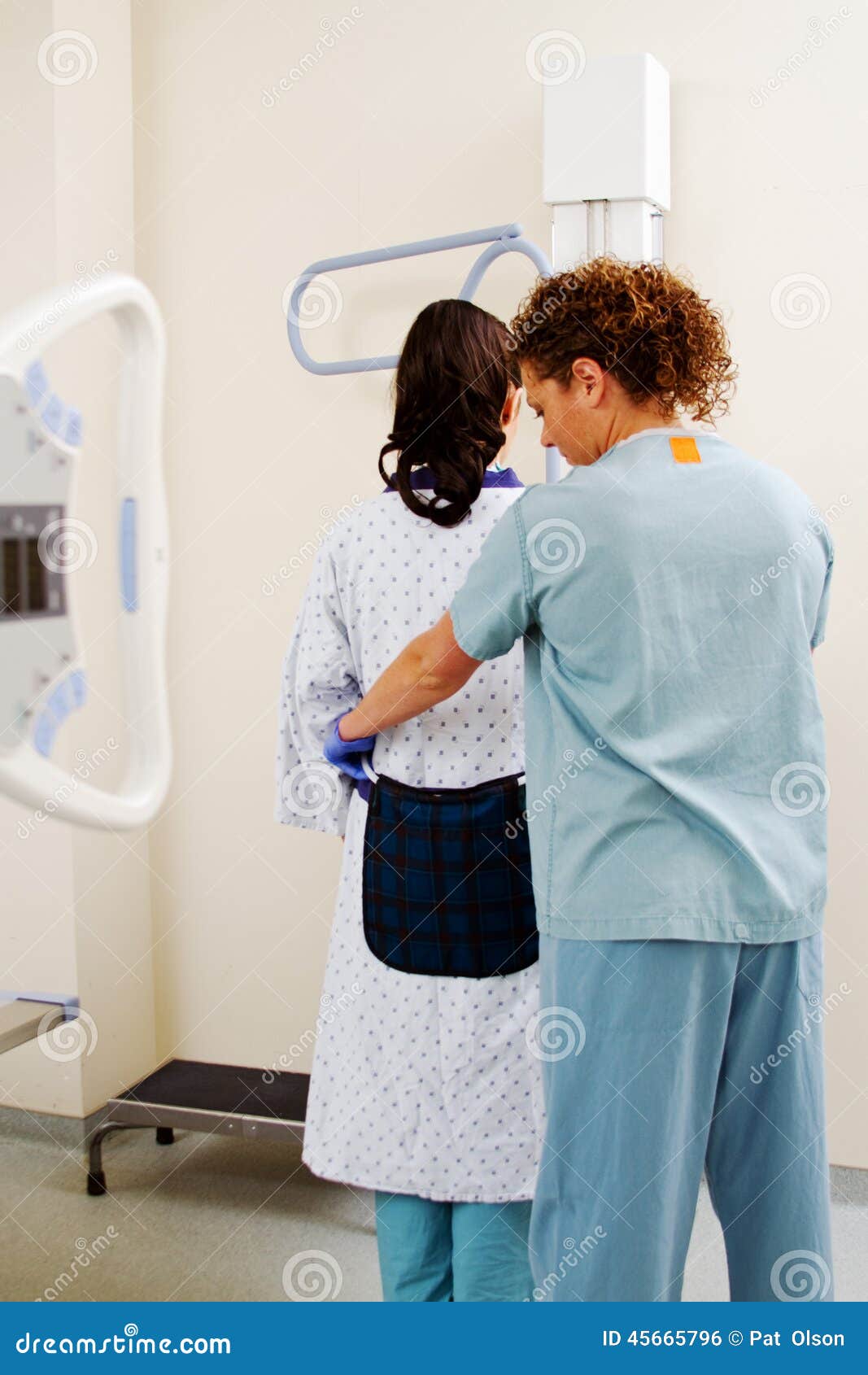 Technician Preparing Patient for X-ray Stock Photo - Image of care ...