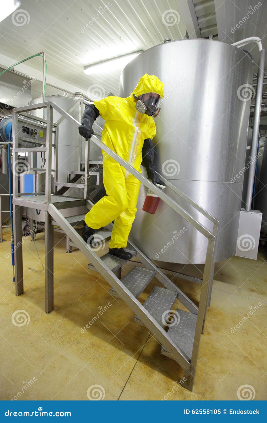 Technician in Protective Coveralls with Sample of Fluid Stock Image ...